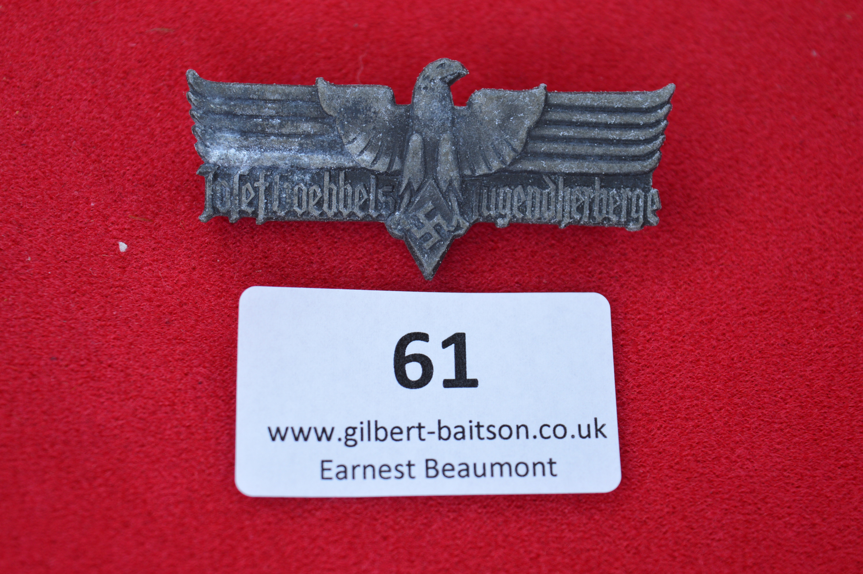 A German Third Reich Commemorative Badge, grey alloy issue, spread ...
