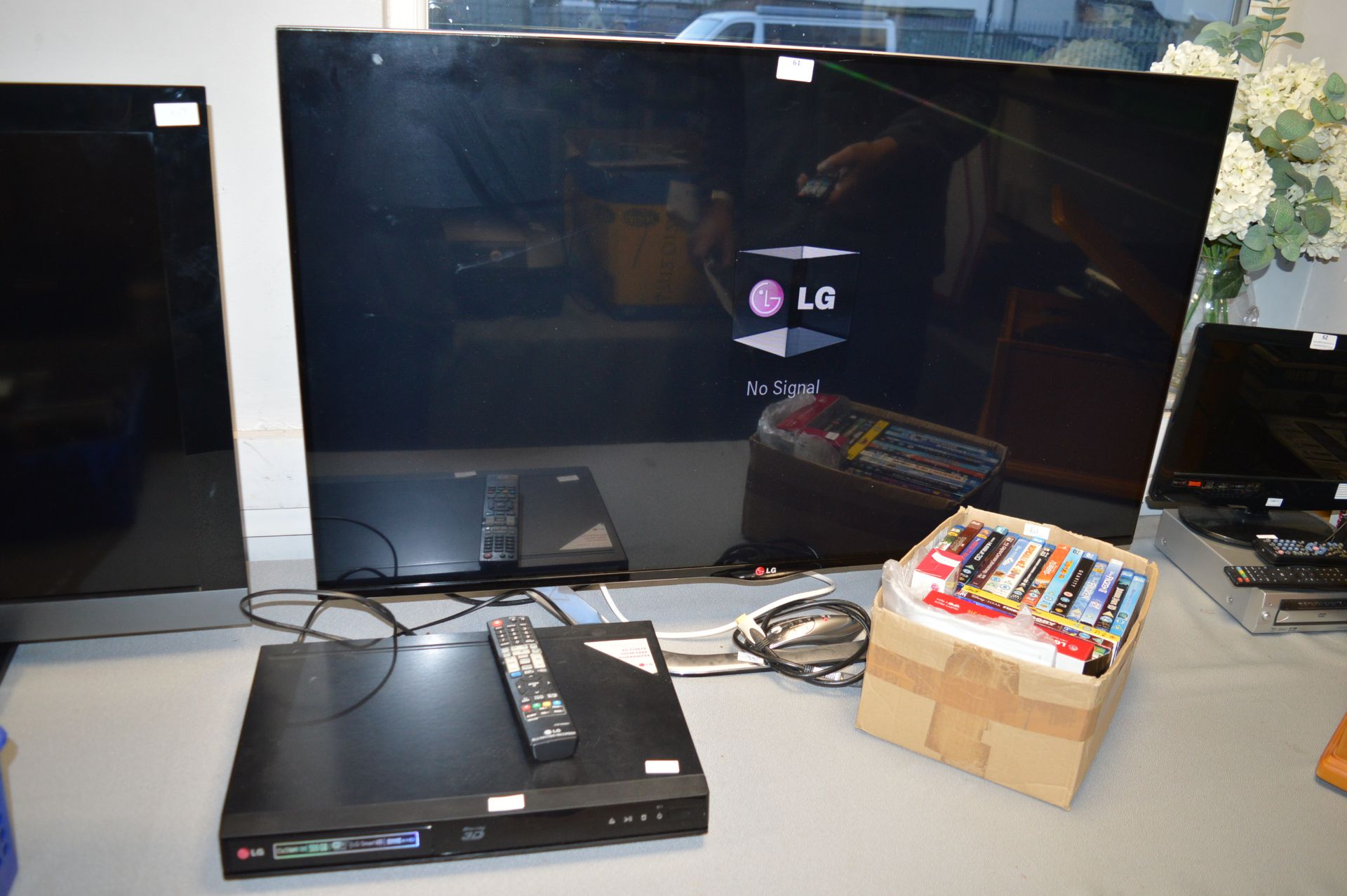 LG 48” 3D TV with 3D Glasses, Blu-ray Discs, and a LG 3D Blu-ray Player