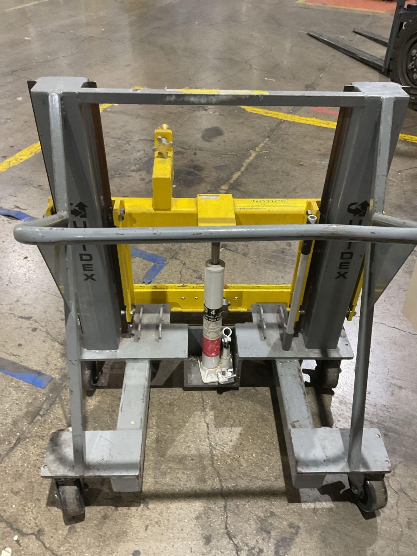 Unidex Model 4-A hydraulic lift rated for a maximum capacity of 2600 ...