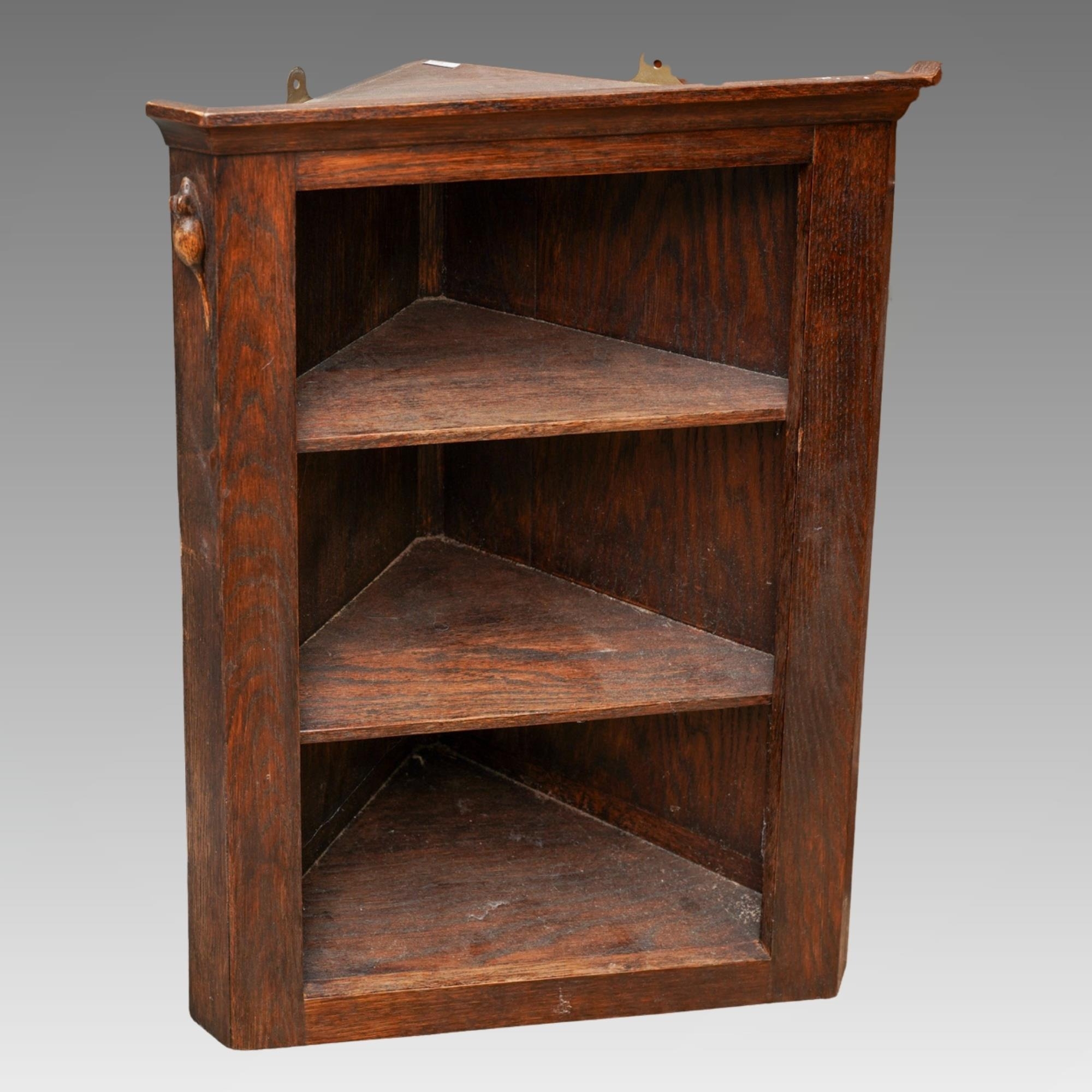 A second half 20th century Mouseman style dark stained oak open front ...