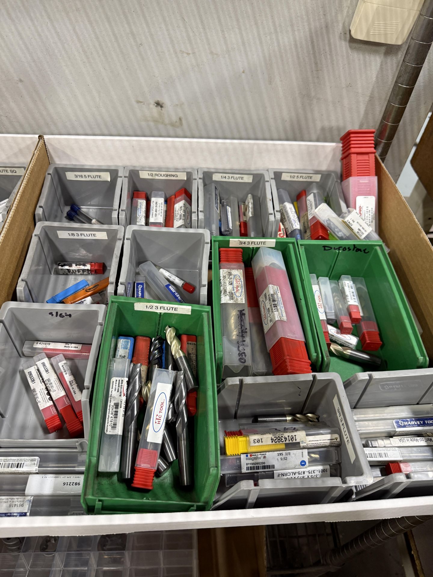 Large Box of Mostly New ORganized End Mills (see photos for more details)