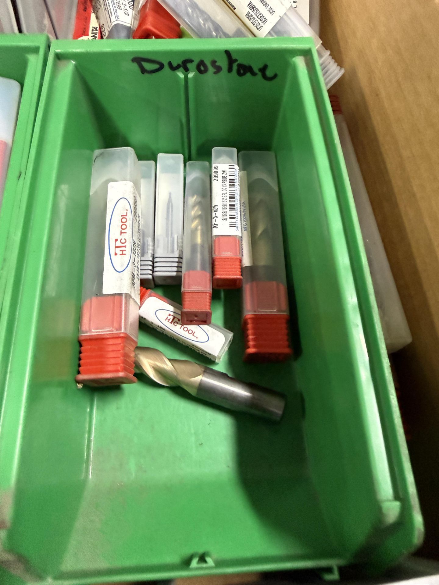 Large Box of Mostly New ORganized End Mills (see photos for more details)