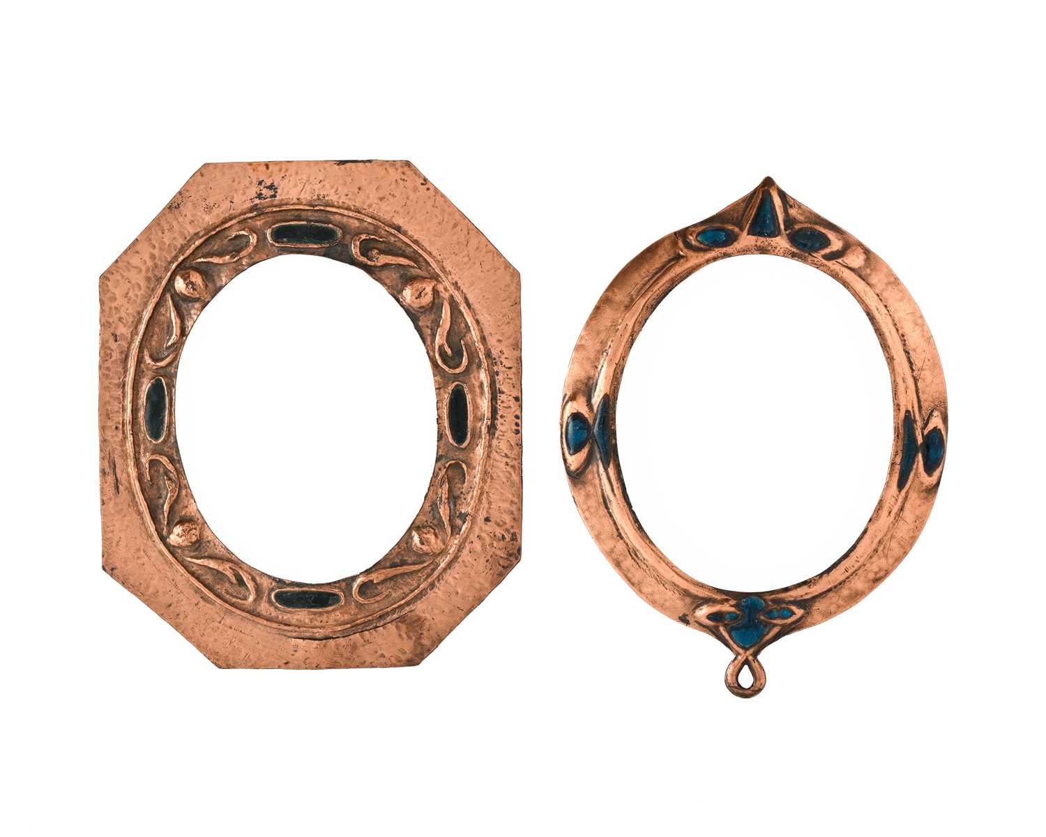Two Arts and Crafts copper and enamel frames, one of octagonal form ...