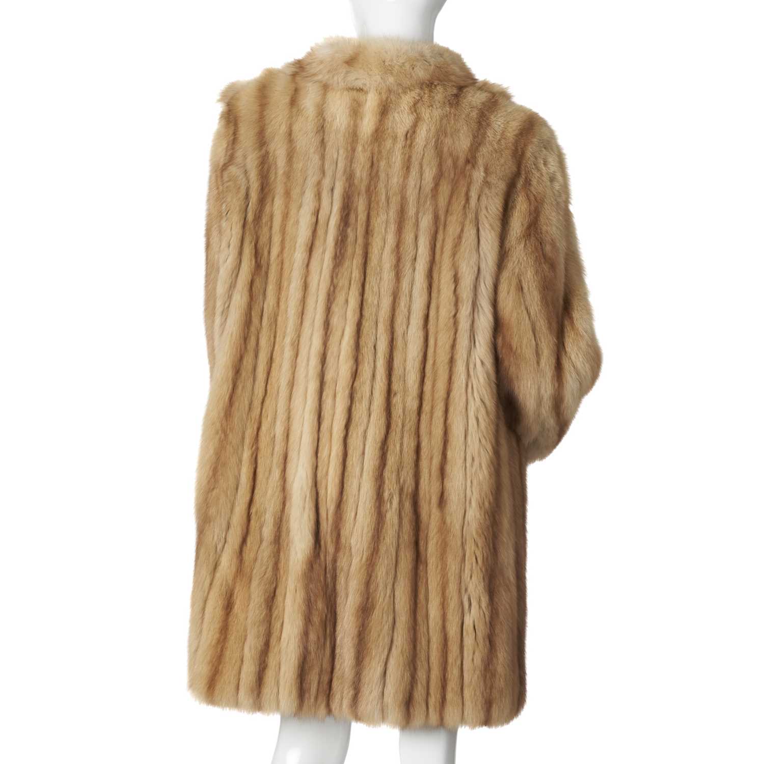 Alixandre Furs, a golden sable fur coat, featuring a Mandarin collar ...