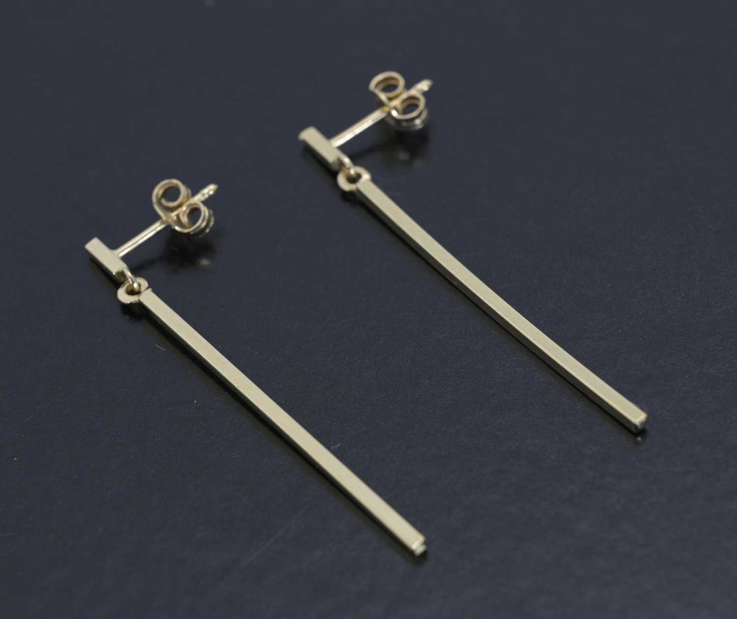 A pair of 18ct gold drop earrings, with fixed posts for pierced ears ...