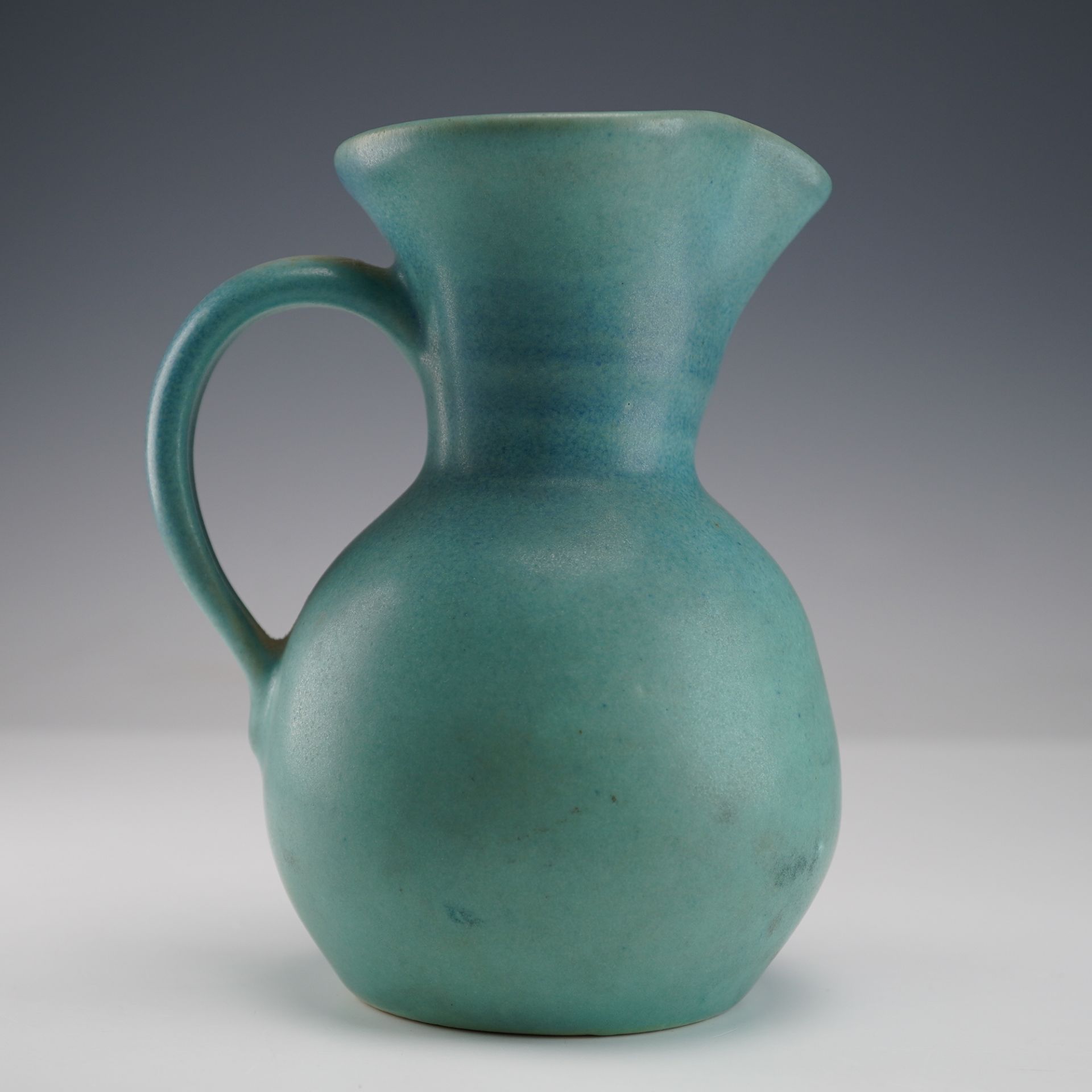 Van Briggle pottery creamer jug in a matte turquoise glaze with a ...