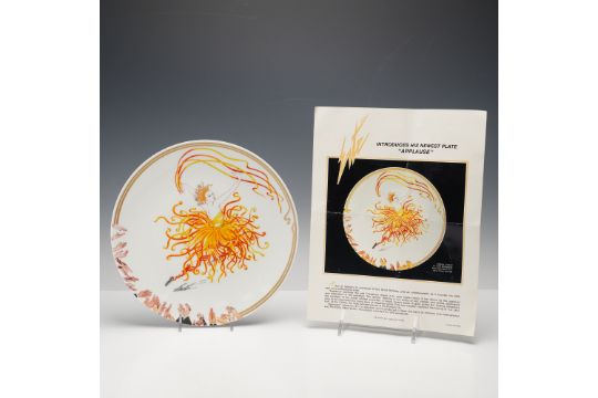 A limited edition porcelain collector's plate designed after Erte's ...