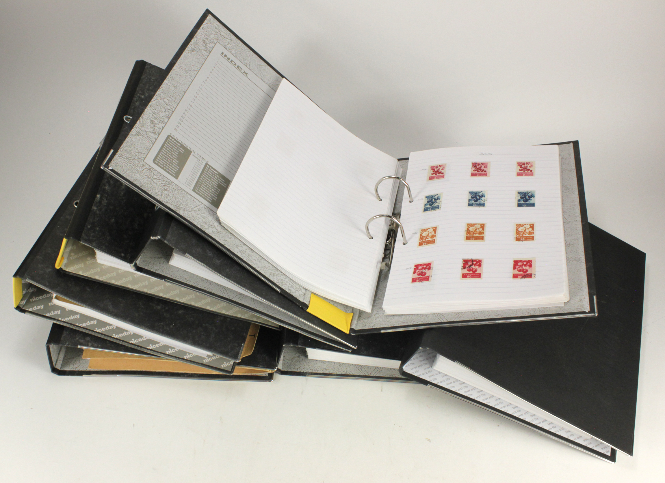 Original unpicked collection sorted alphabetically on pages in binders ...