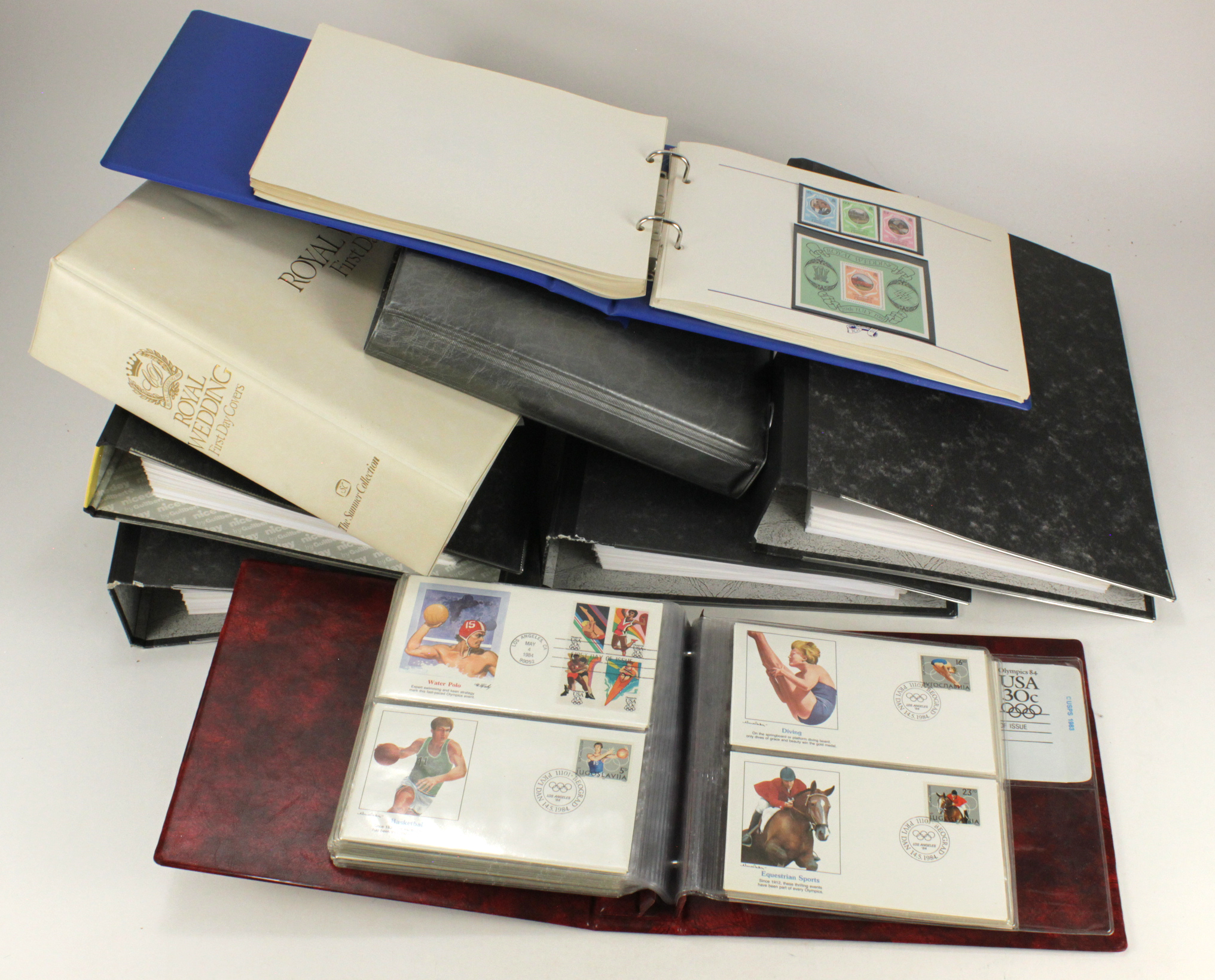 Original unpicked collection sorted alphabetically on pages in binders ...