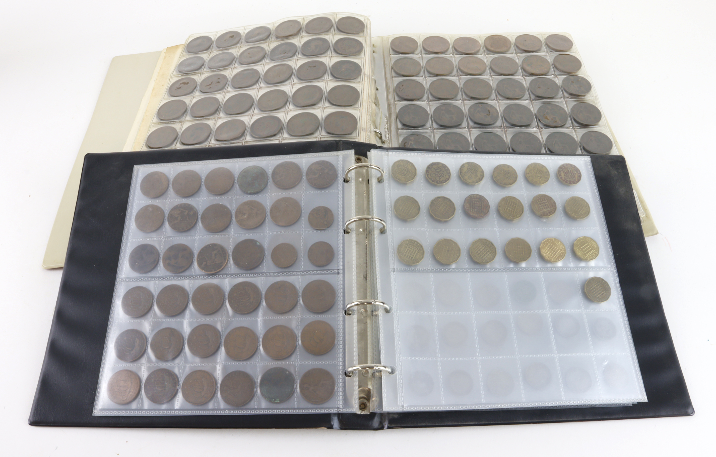 GB & World Coins in two albums, silver noted in the larger album.