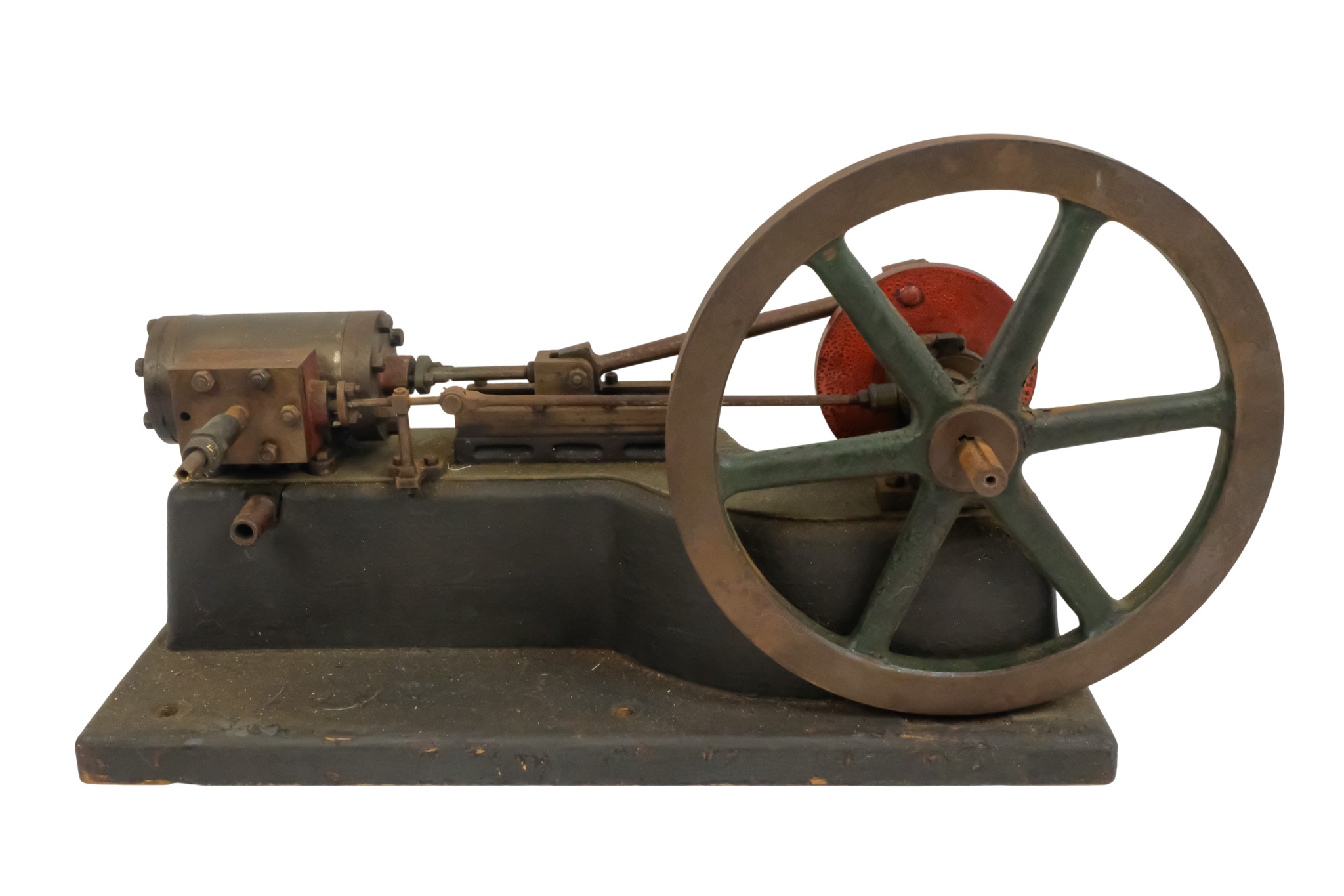 An early 20th century horizontal steam engine - with green and red ...