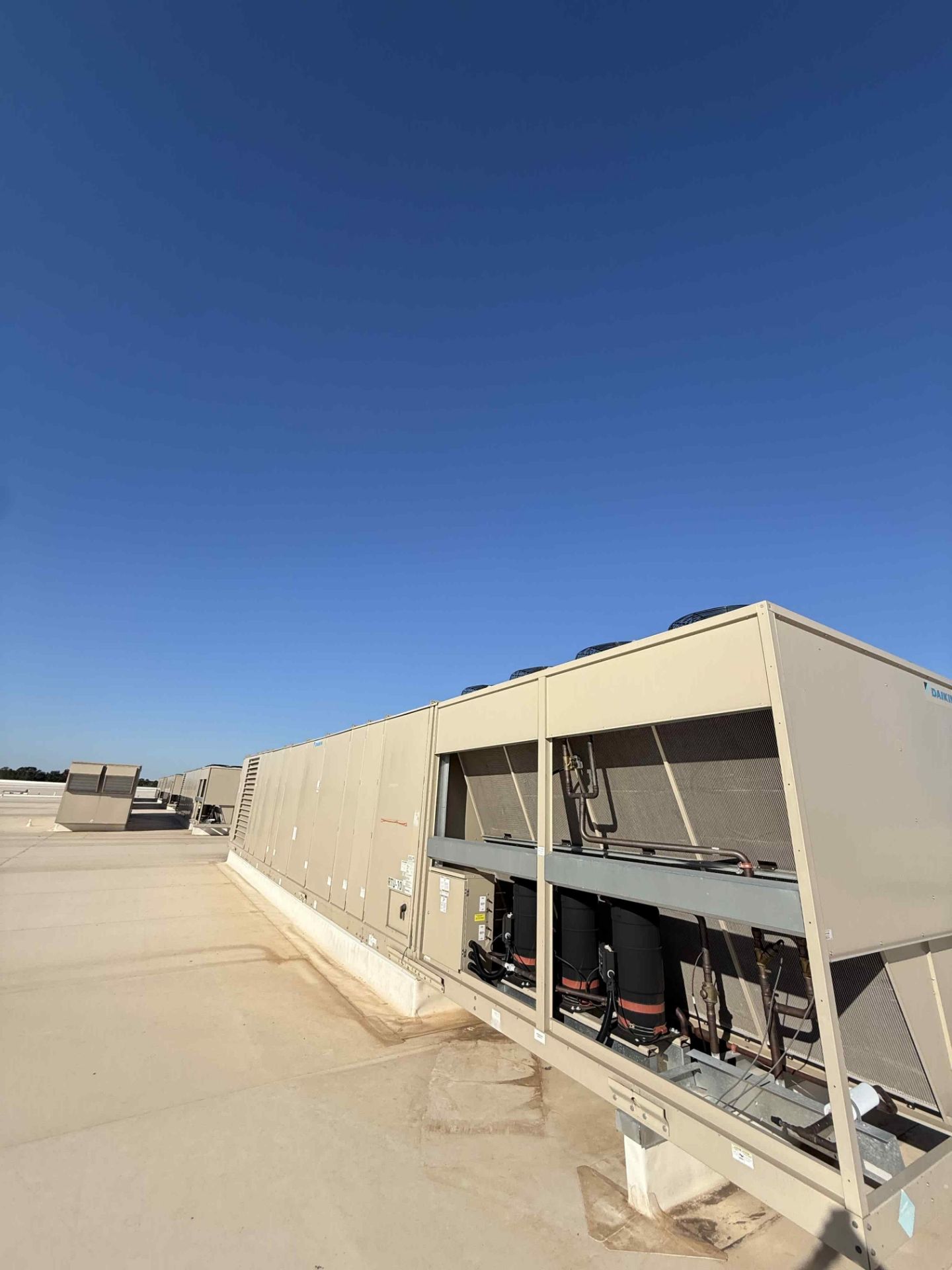 Offered is RTU-13, a Daikin RPS130D packaged rooftop system designed ...
