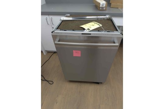 Bosch stainless dishwasher with concealed controls; includes top ...