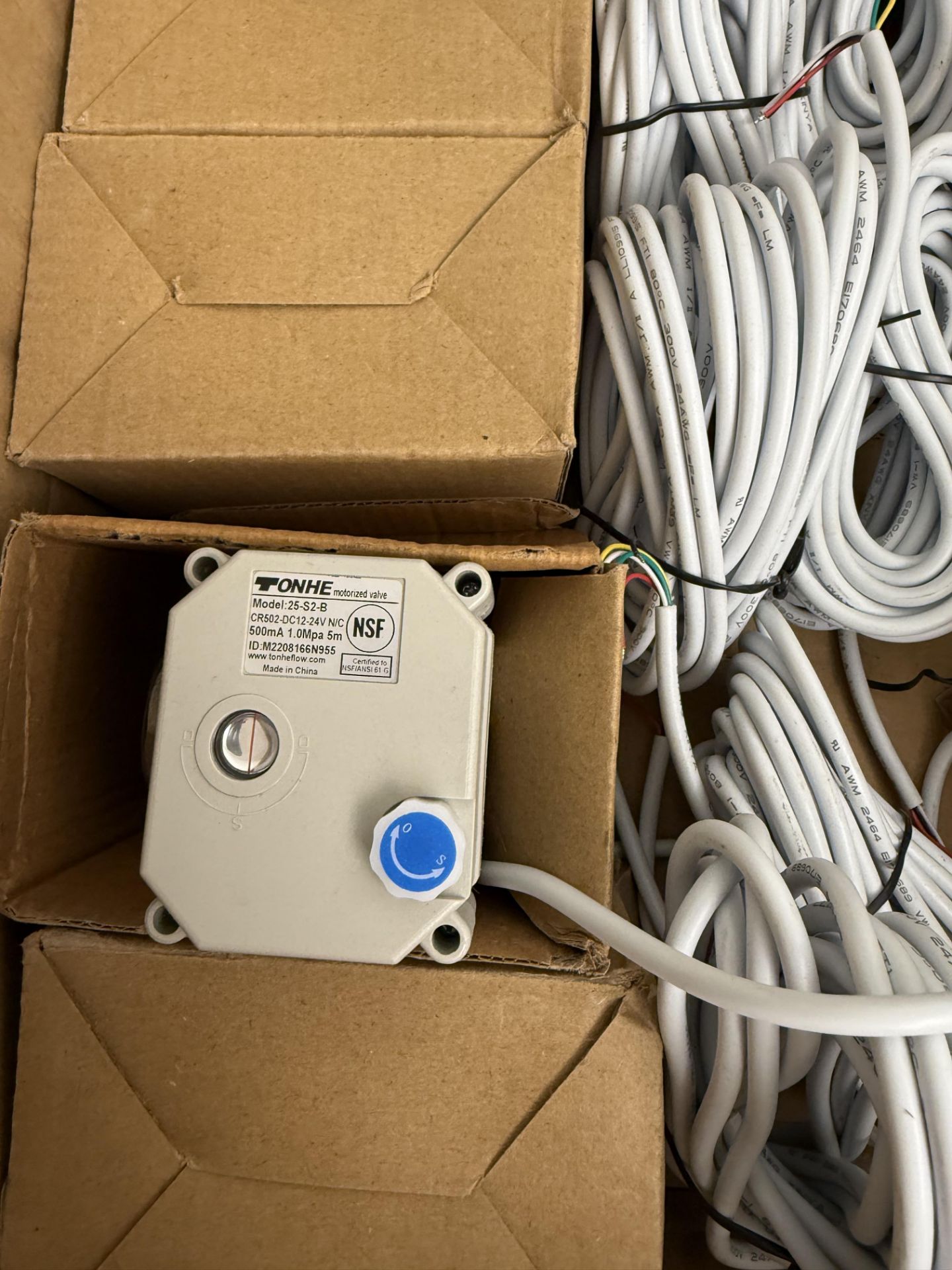 This lot includes multiple Tonhe 2S-52-B motorized valve assemblies ...