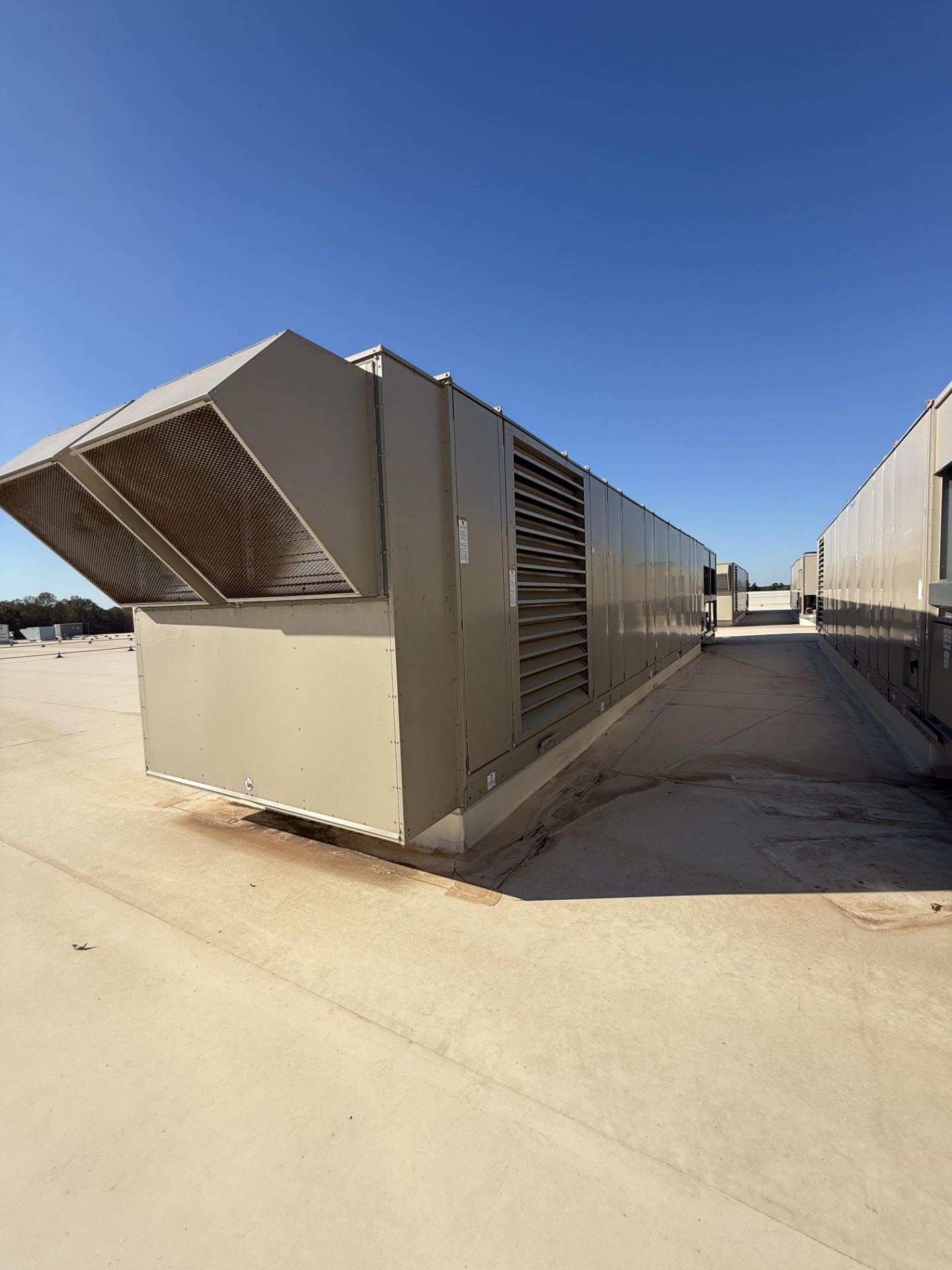 This listing covers RTU-12, a Daikin RPS 130D RoofPak rooftop HVAC unit ...