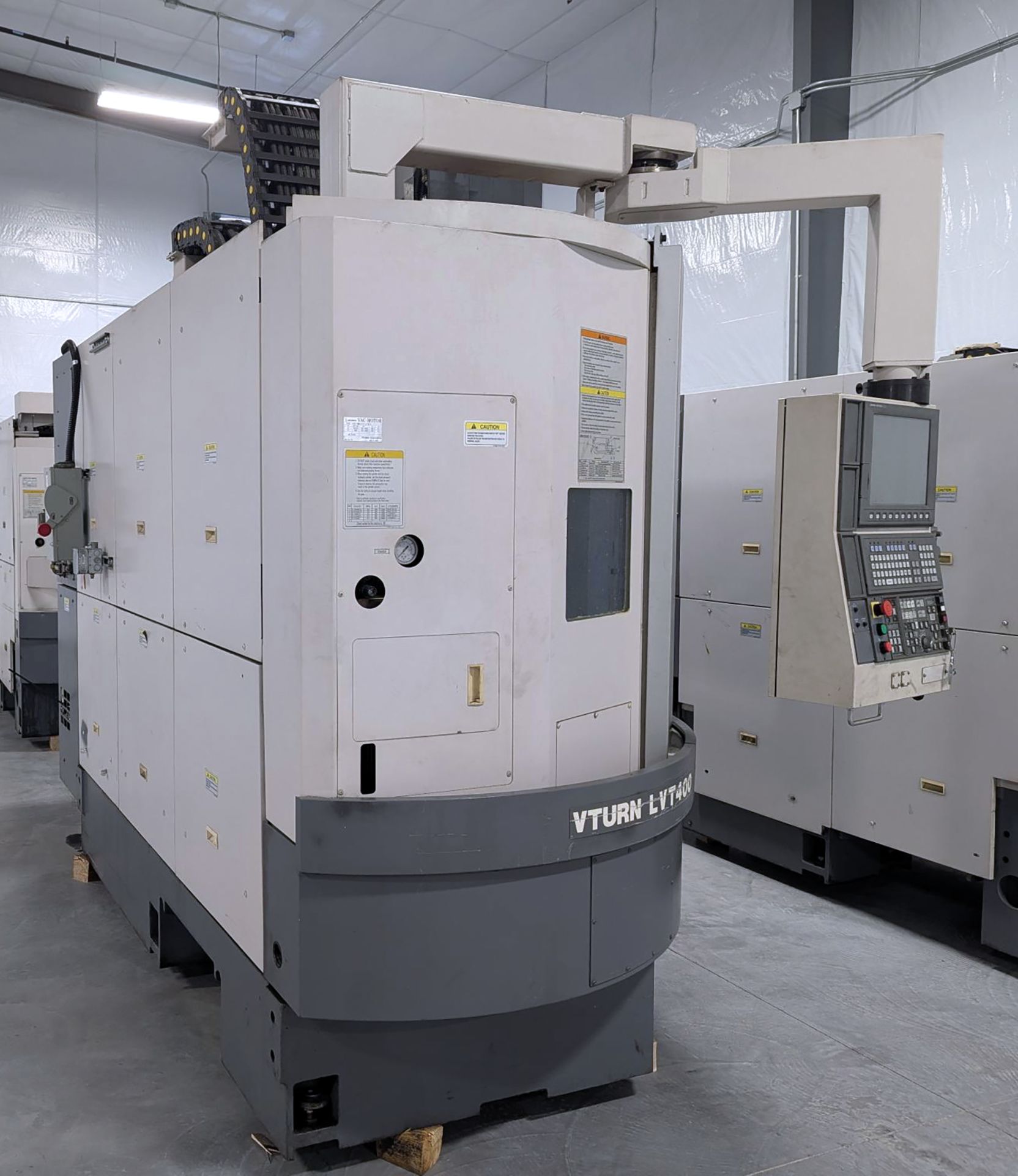 Okuma LVT 400 Vertical Turret Lathe (2008) Description Chuck size 12 ...