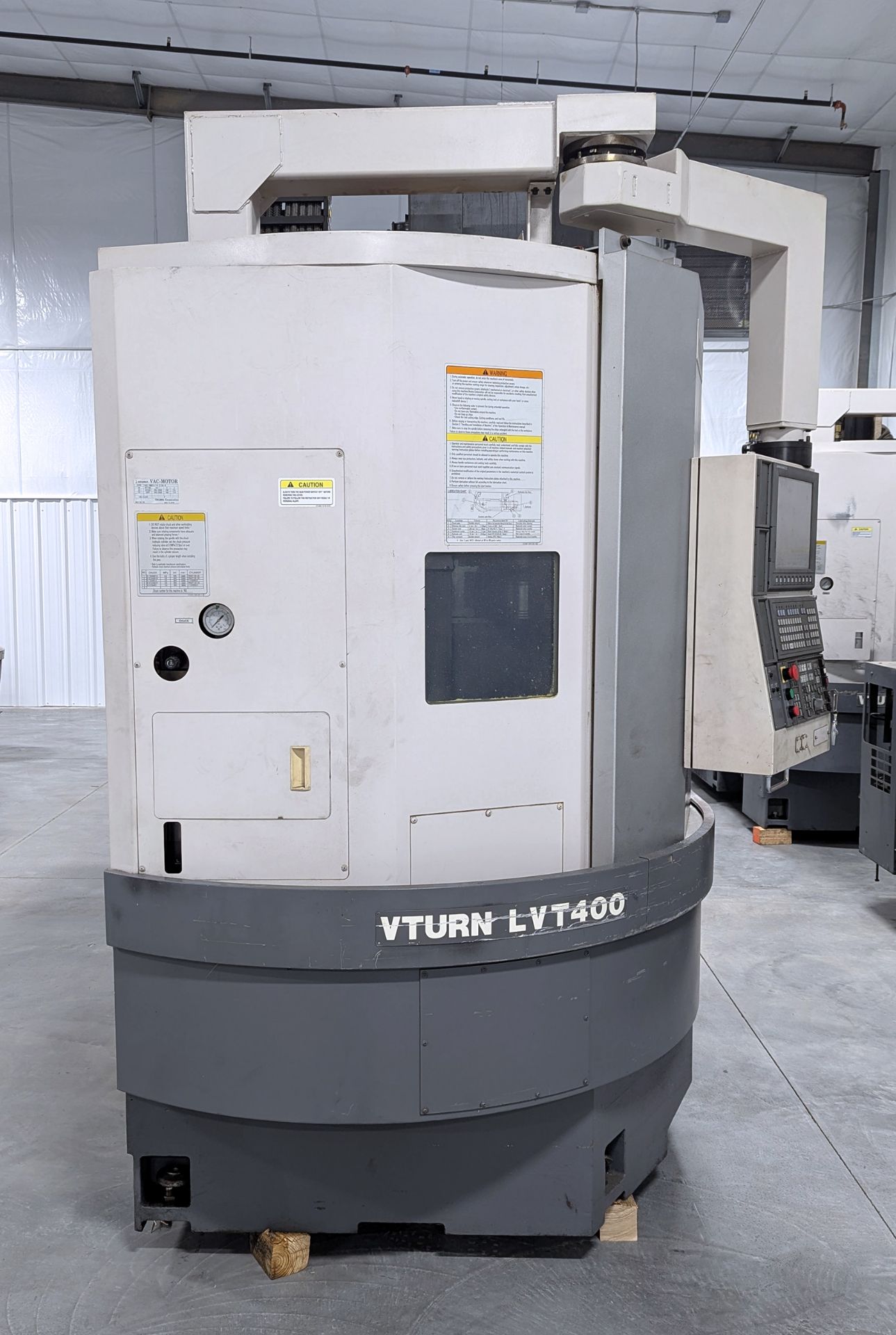 Okuma LVT 400 Vertical Turret Lathe (2008) Description Chuck size 12 ...
