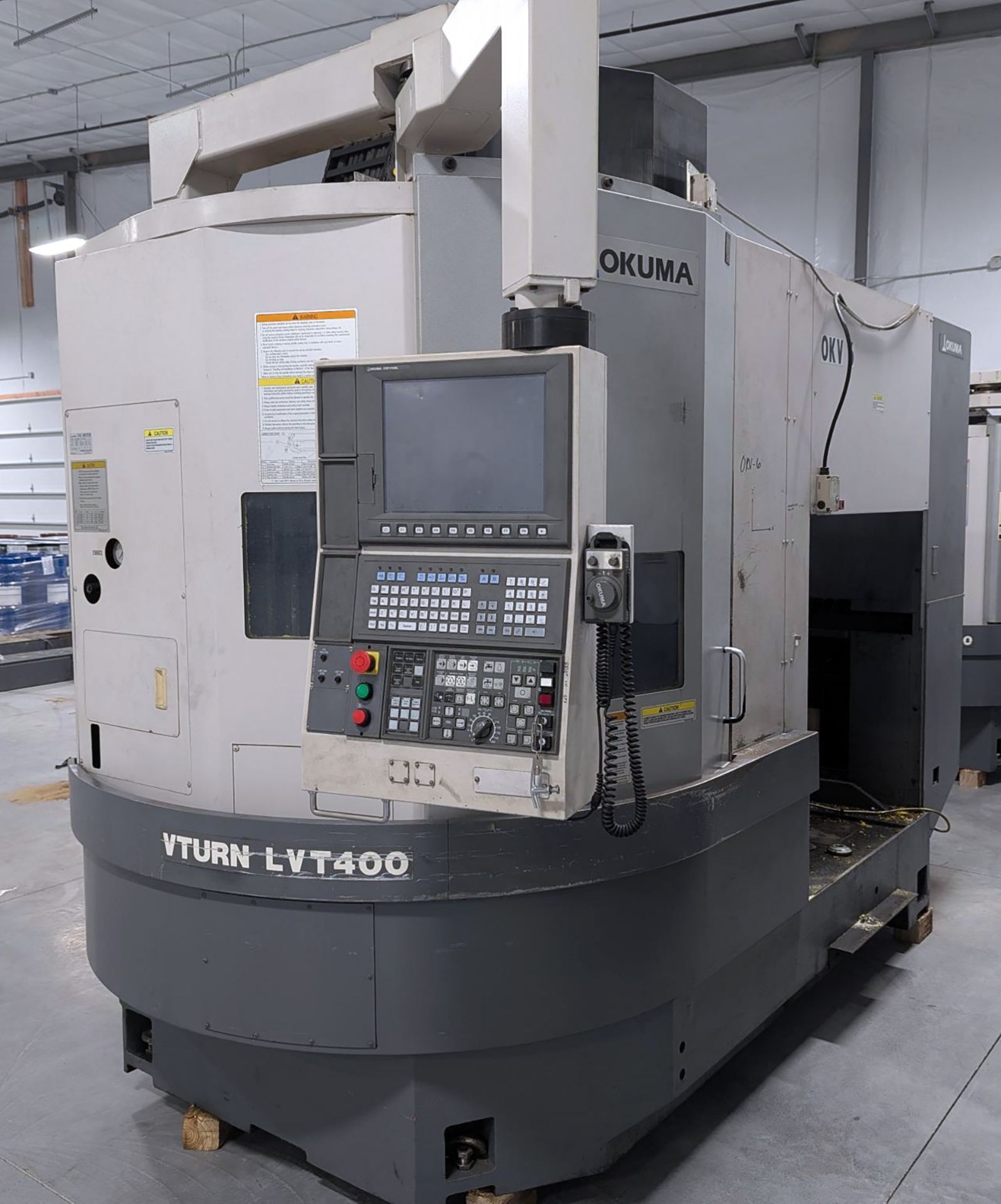 Okuma LVT 400 Vertical Turret Lathe (2008) Description Chuck size 12 ...