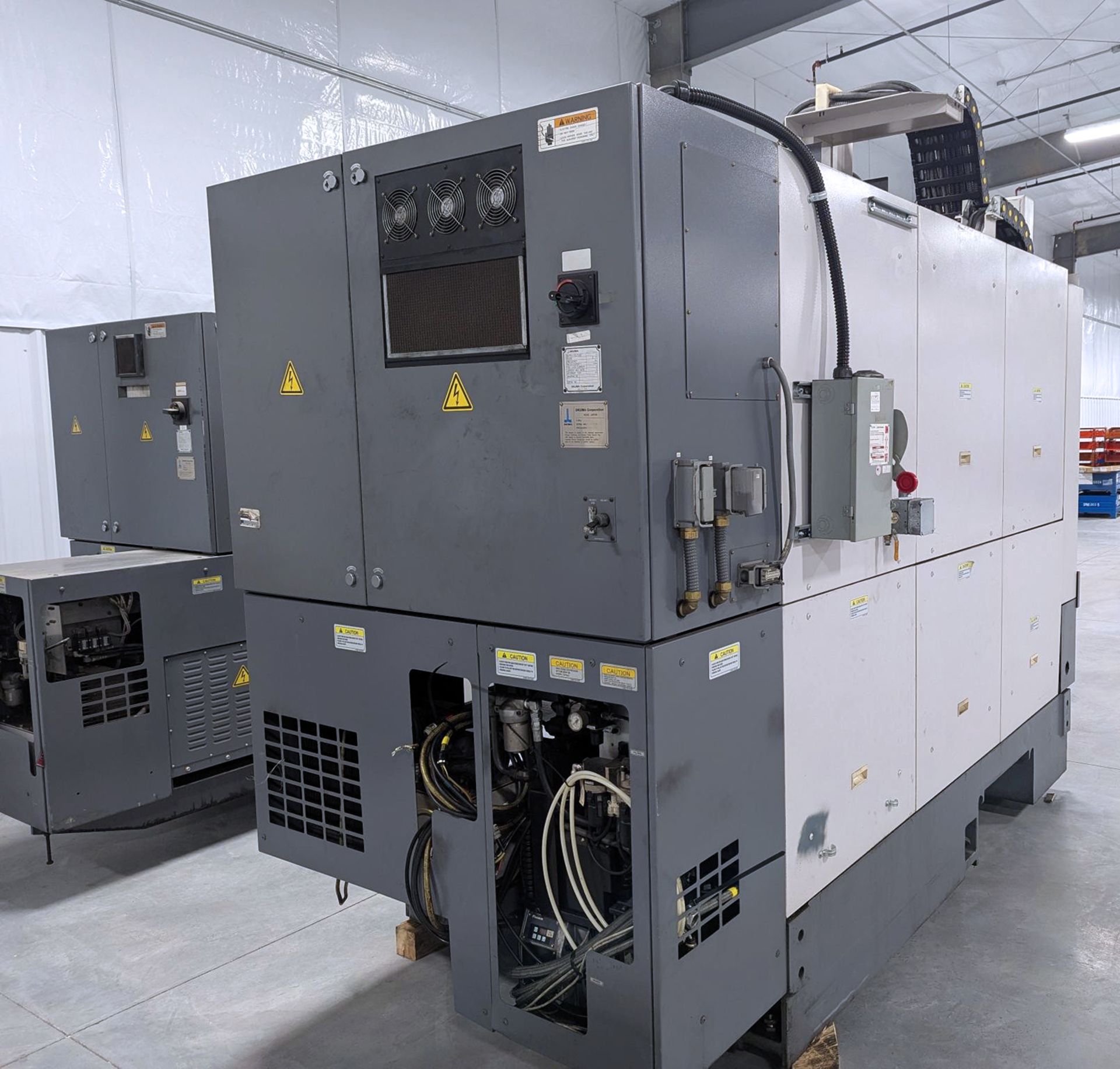 Okuma LVT 400 Vertical Turret Lathe (2008) Description Chuck size 12 ...