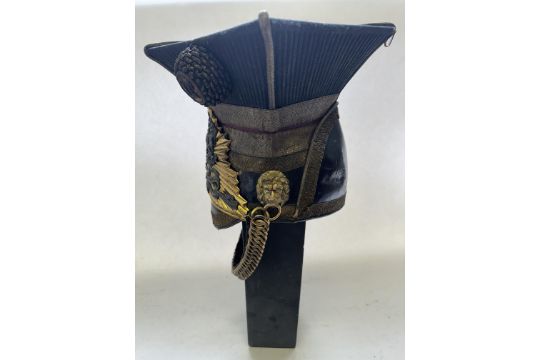 A VICTORIAN CHAPKA OF THE 16TH LANCERS with black leather skull and ...