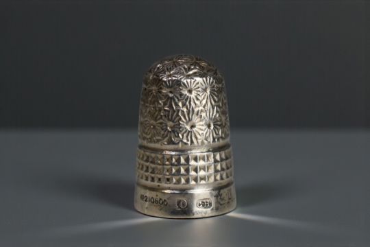 A collection of interesting Thimbles, to include Silver and Charles ...
