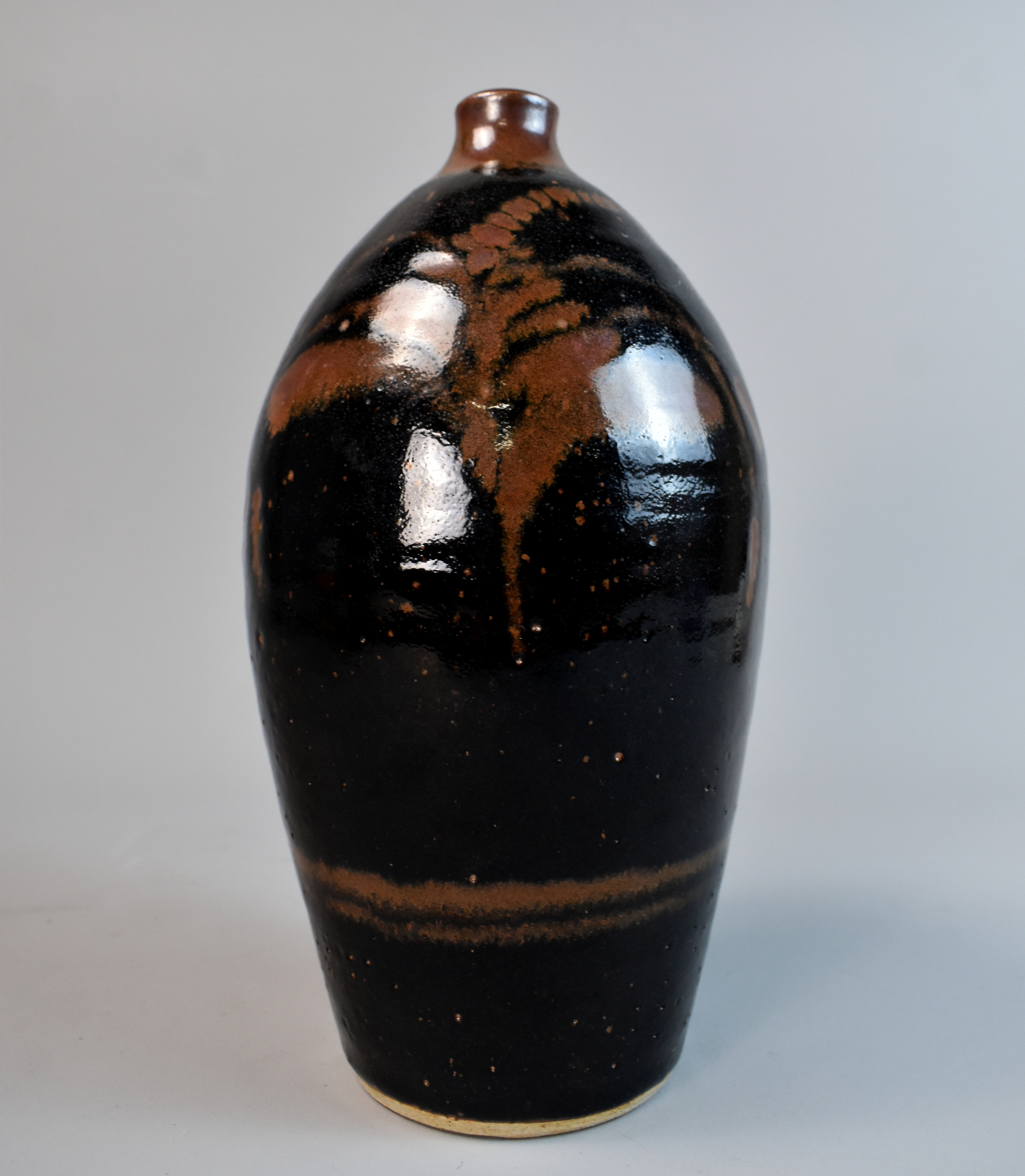 A David Leach? Art pottery bottle vase. Tenmoku glaze with iron ...