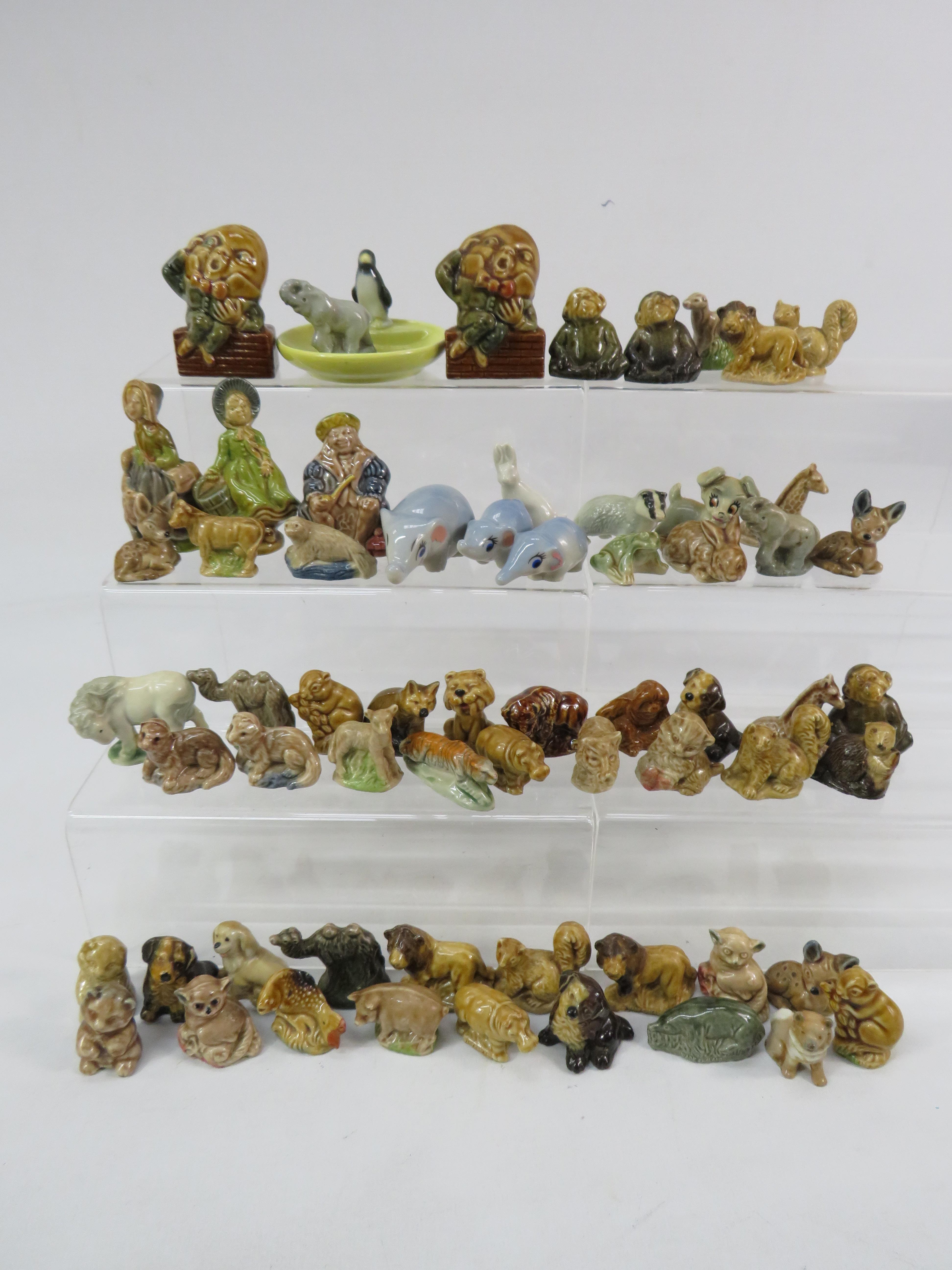 Further collection of Wade porcelain Whimsies and small figures ...