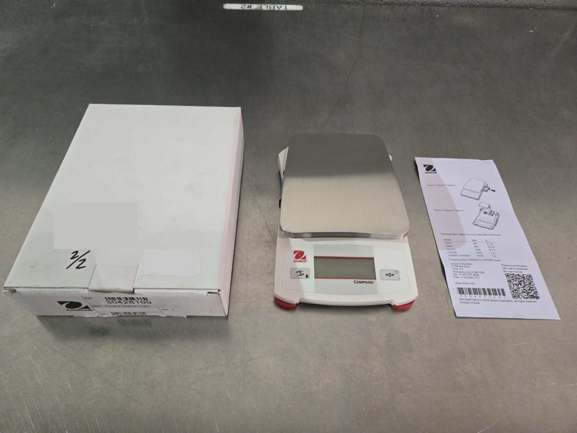 (2) Ohaus portable balances, model CX221, uses AA batteries (not included)