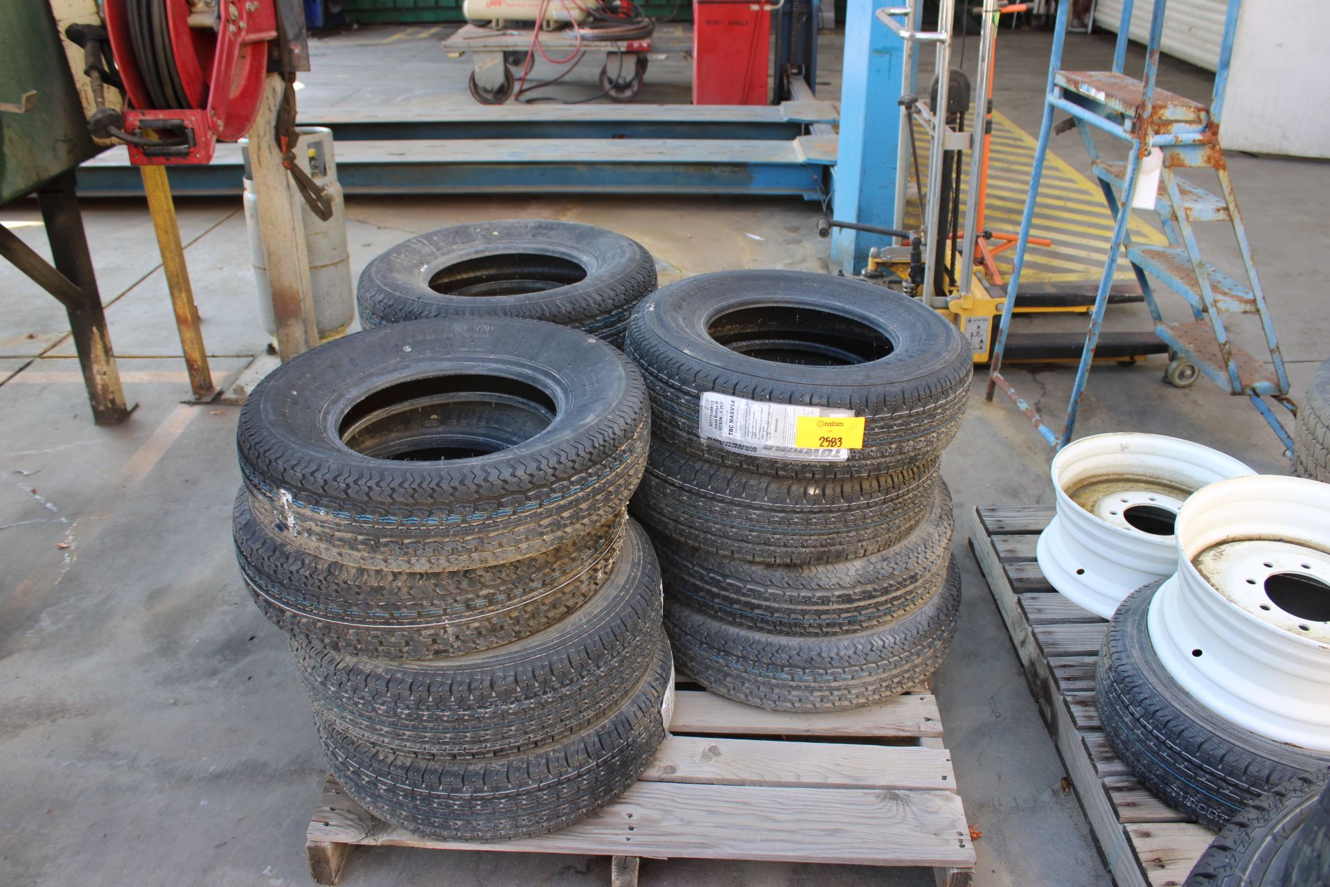 [Lot] of assorted light truck tires and wheels on (2) pallets [Mechanic ...