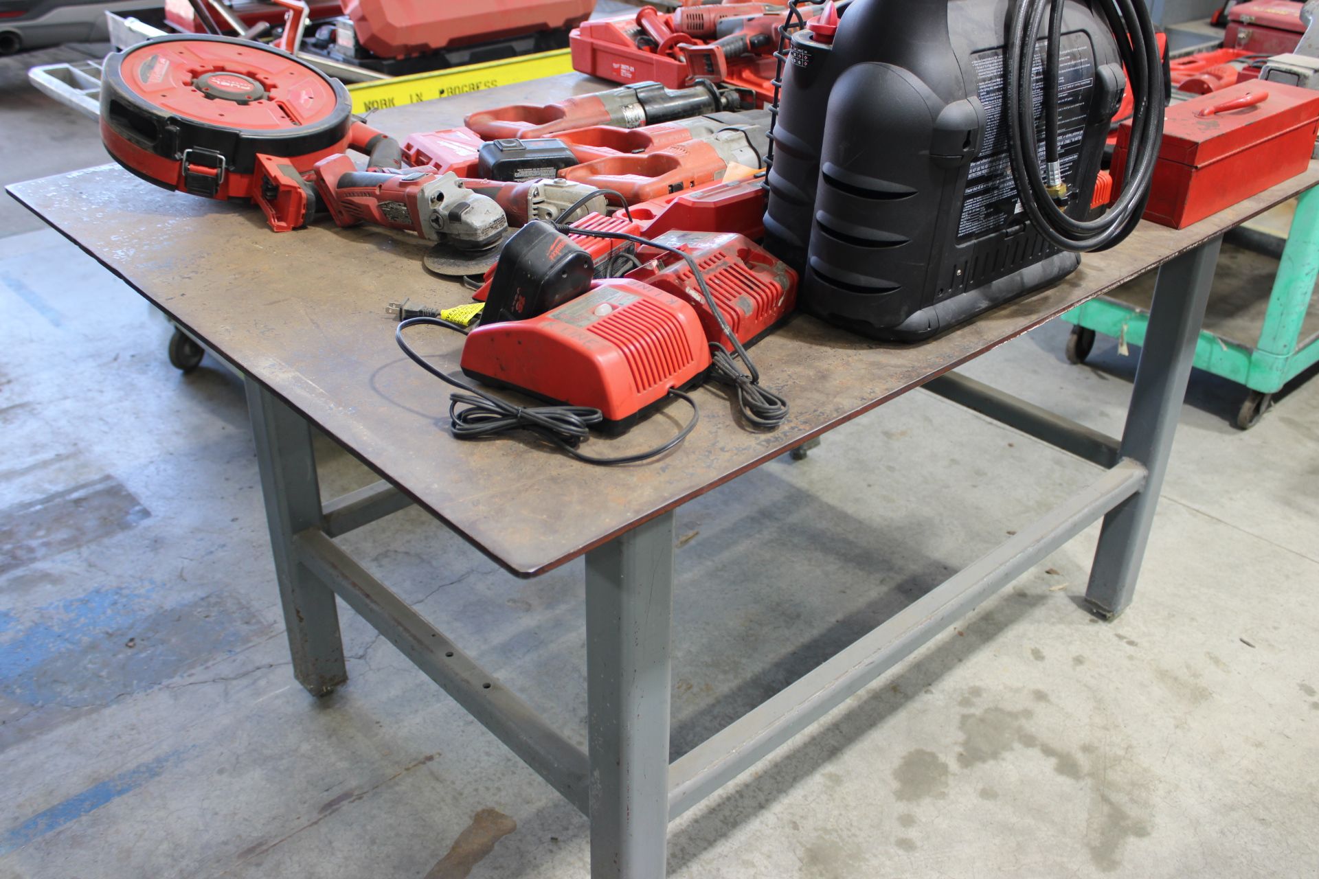 [Lot] of (3) steel shop tables with vises, measuring 52"l x 50"w, 72"l ...
