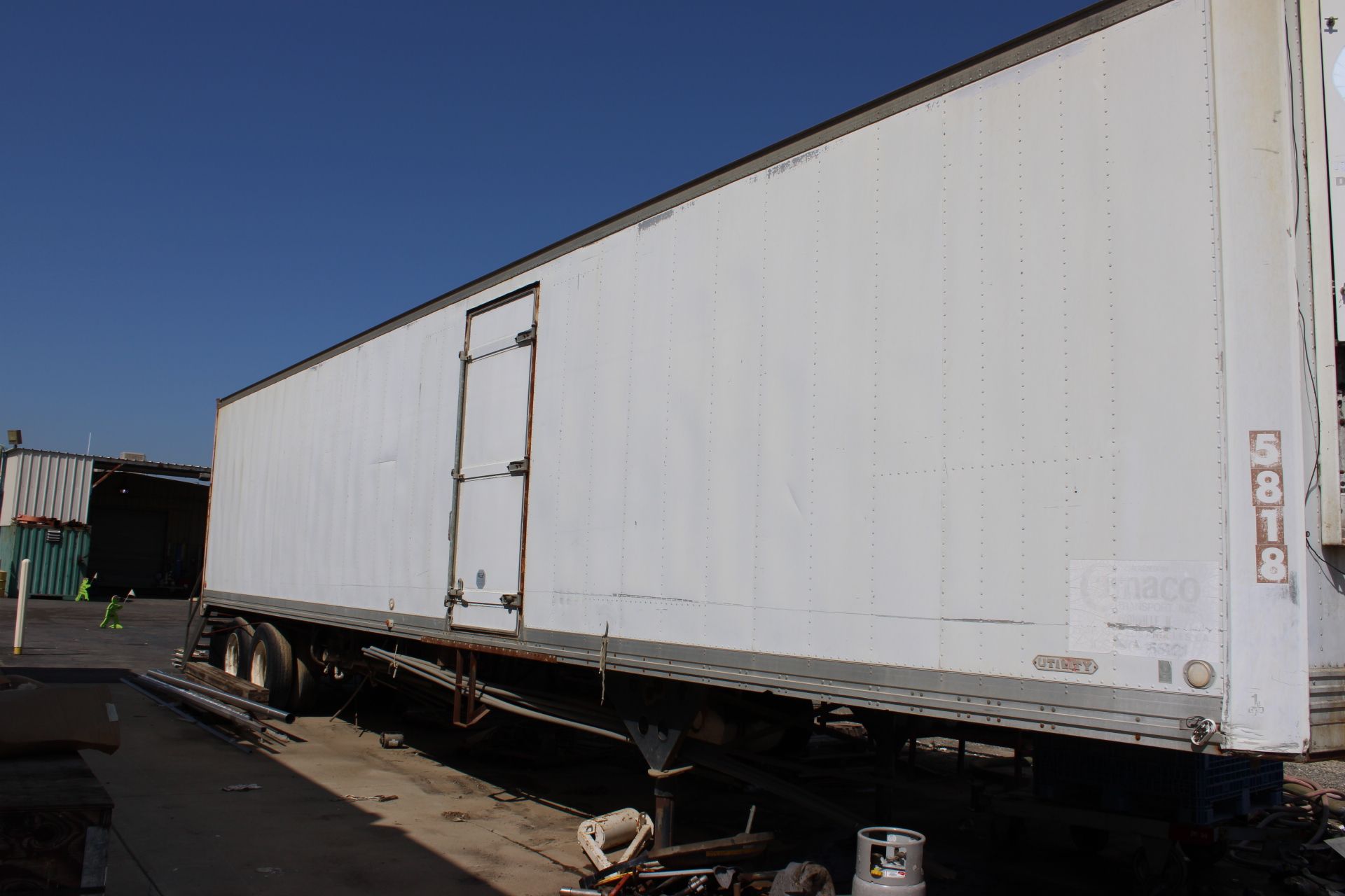 1987 Semi van shop trailer, 50' with work bench, shelving units ...