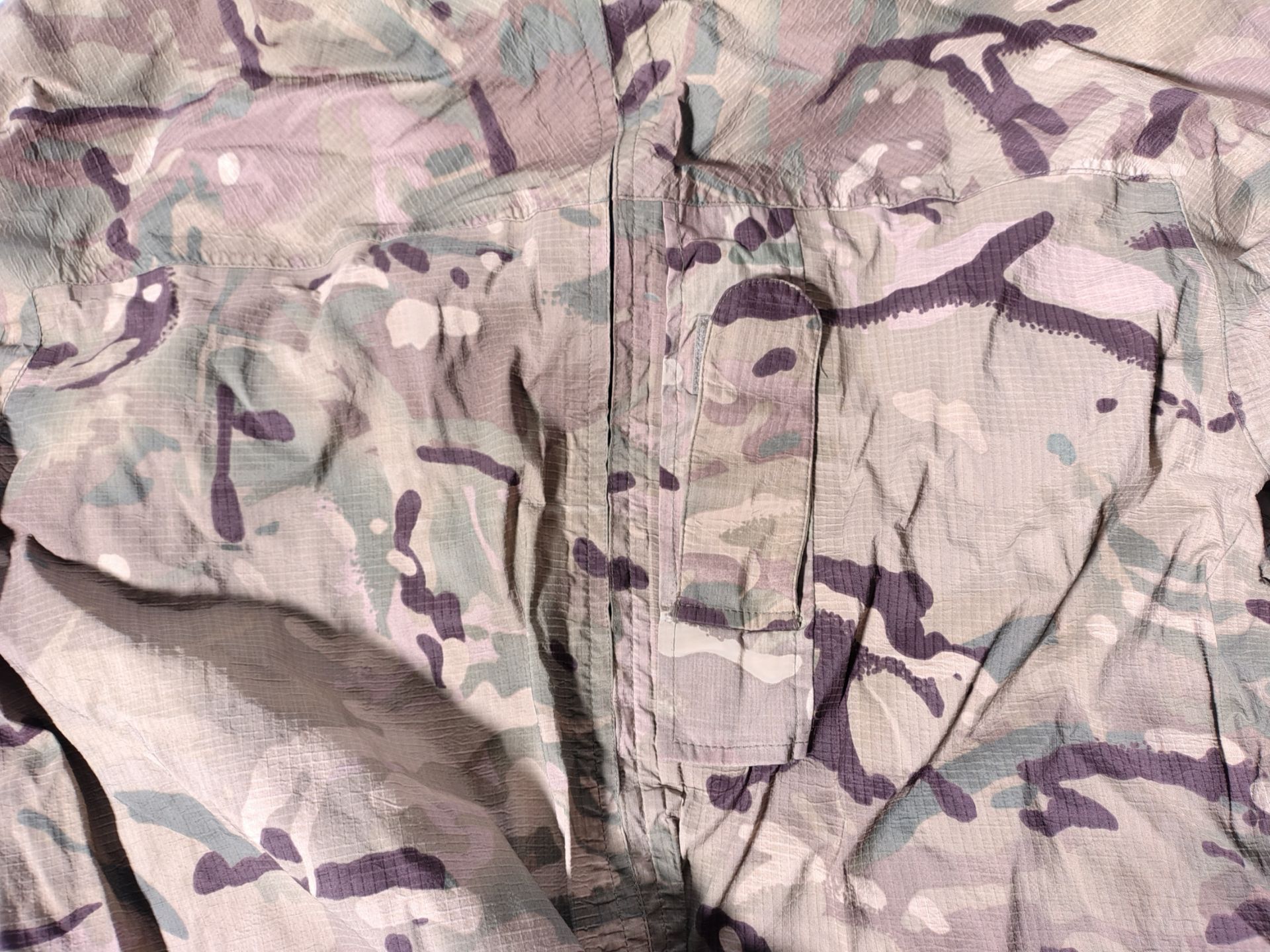 Various types of ex-military camo clothing - may include accessories ...