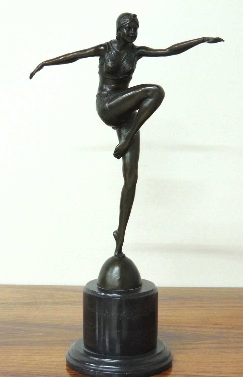 ART DECO STYLE BRONZE FIGURE OF A DANCER, mounted on a composite black ...