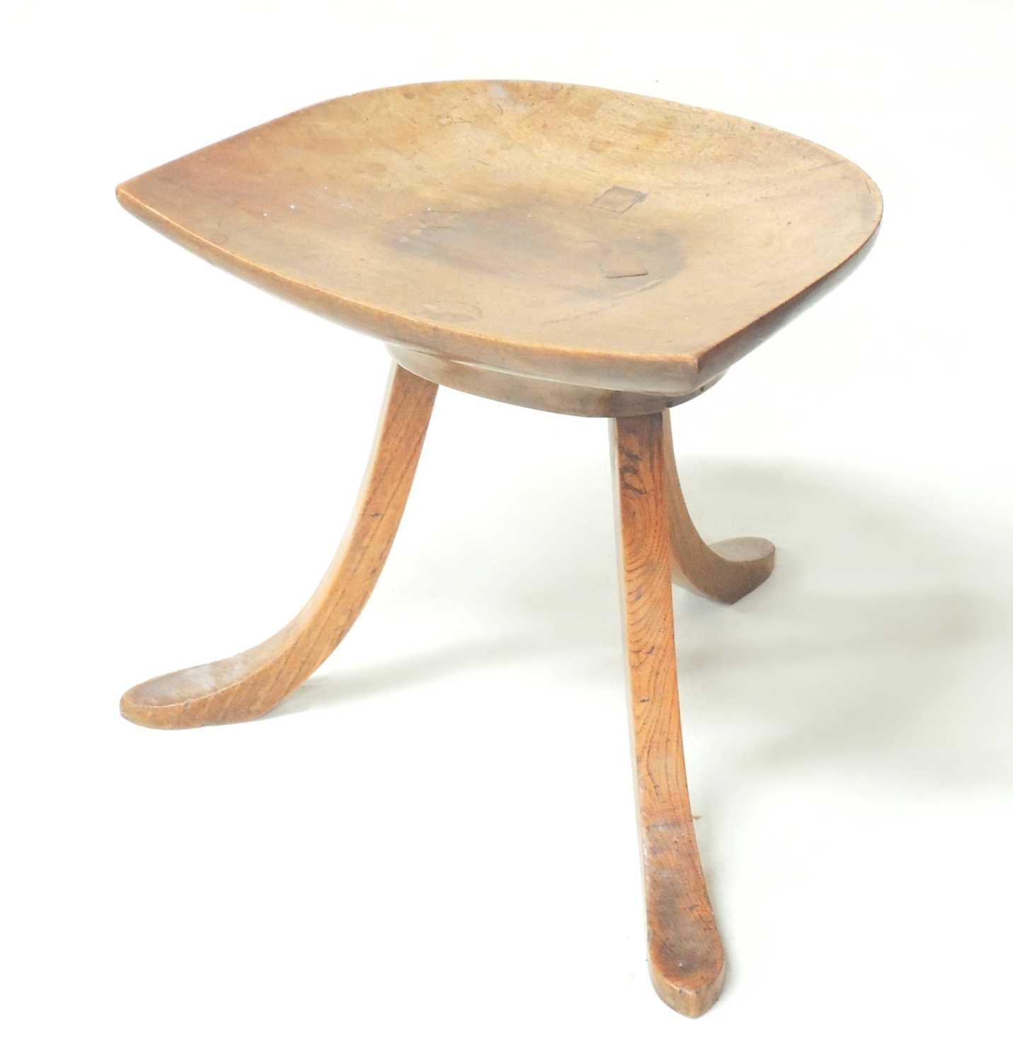 LIBERTY THEBES STOOL, dished walnut seat, on three shaped elm supports ...