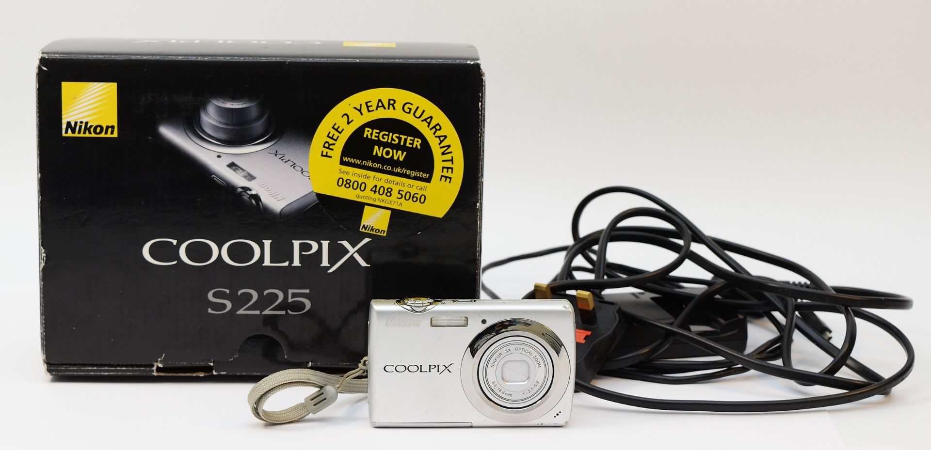 A Nikon Coolpix S225 digital camera, in box.