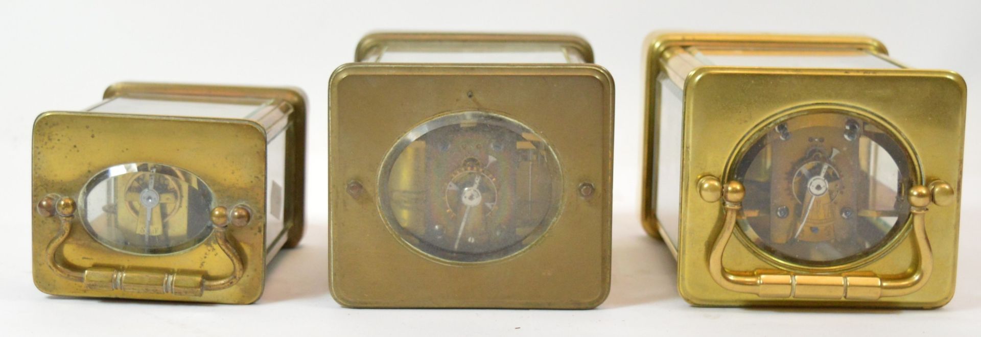 Two brass cased carriage clocks, including an Edwardian 8 day and a ...