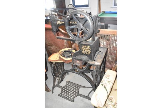 A Victorian saddlers treadle/hand crank sewing machine by Singer, no ...