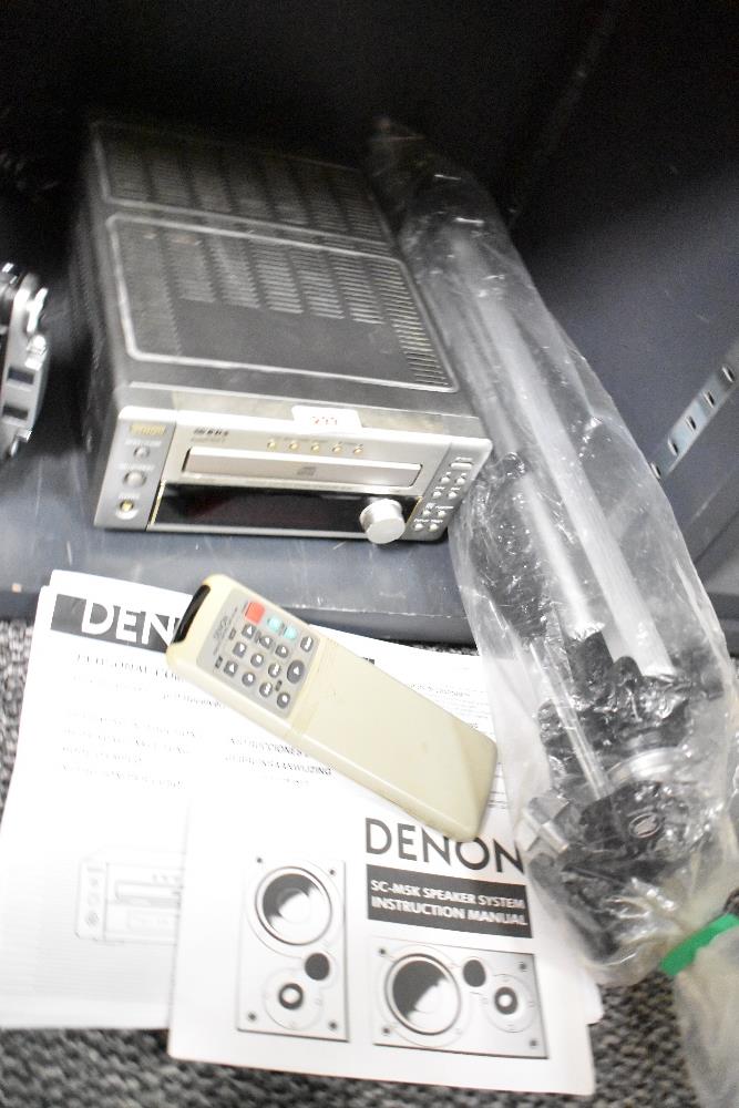 A Denon UD-M3 compact stereo CD, AM/FM receiver system with remote sold ...