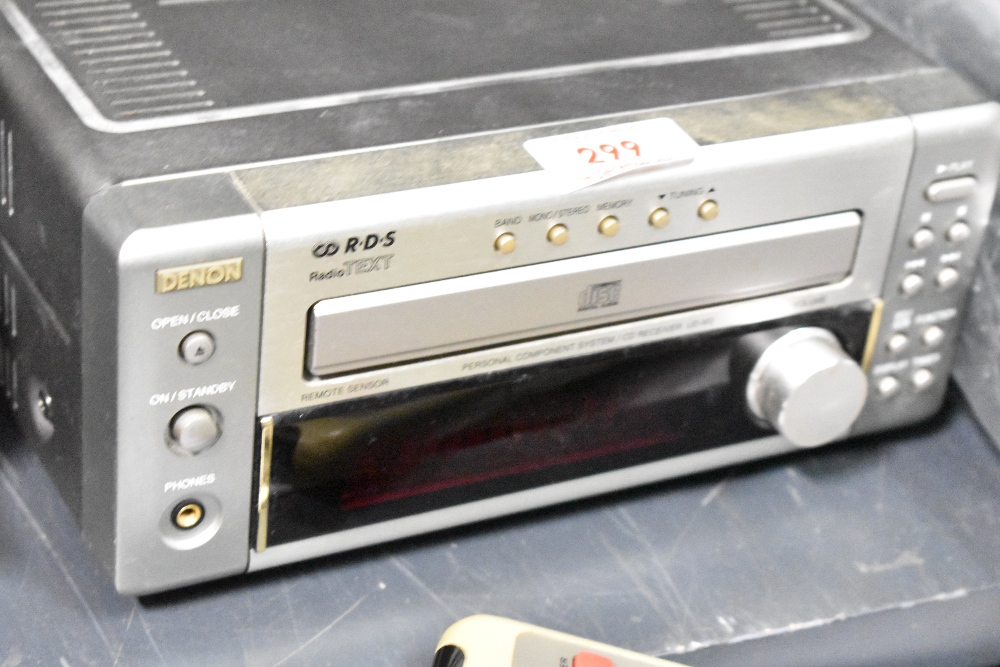 A Denon UD-M3 compact stereo CD, AM/FM receiver system with remote sold ...