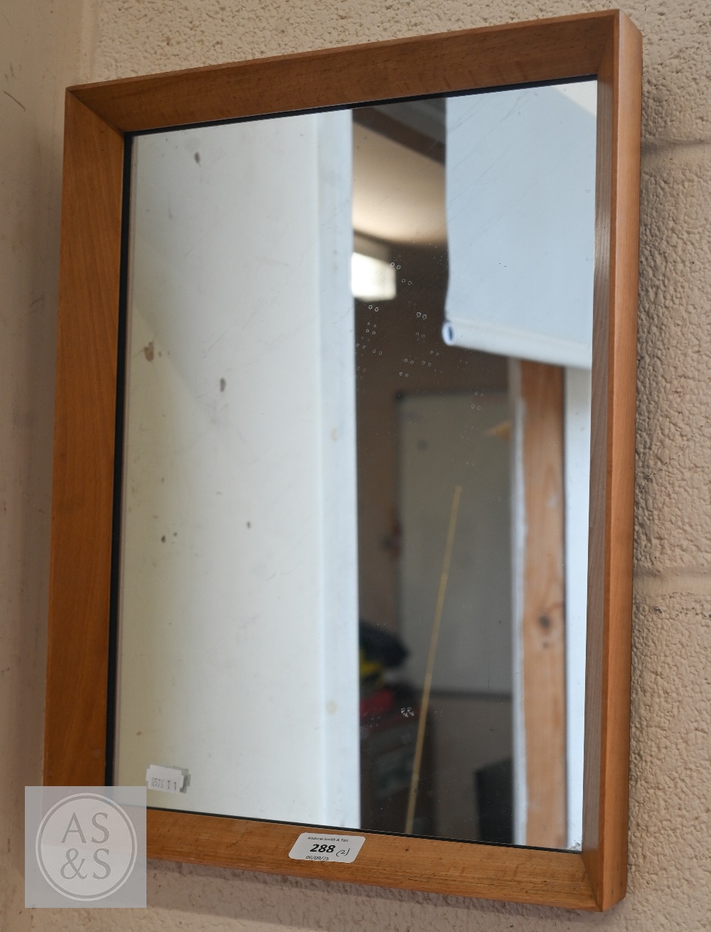 A 1950s/60s Rowley Design beech framed wall mirror (as exhibited at the ...