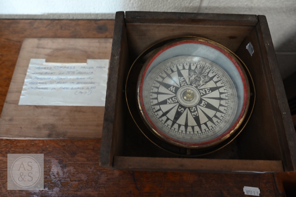 An antique boxed brass boat compass on gimbals; note says 'Salvaged ...