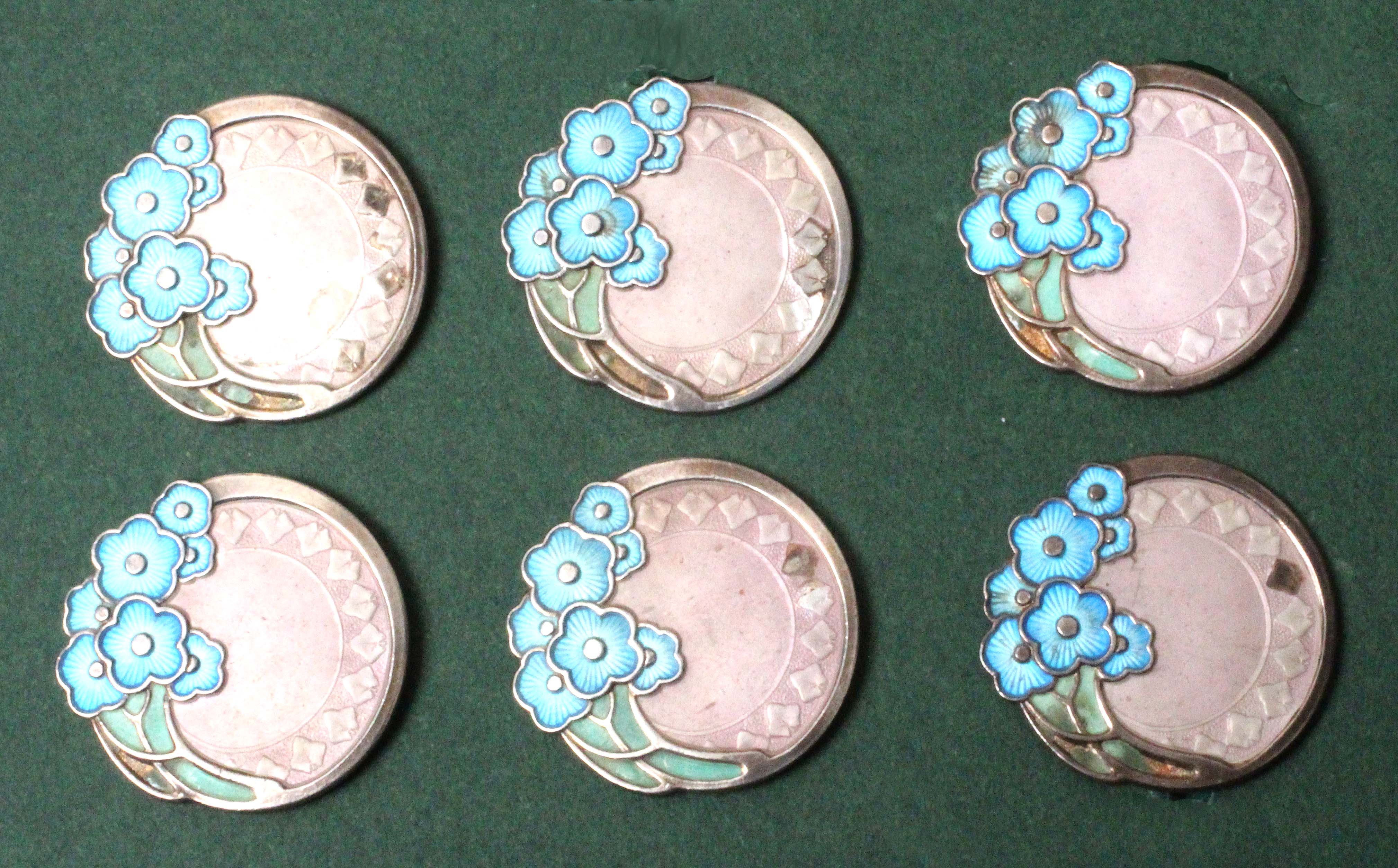Buttons, silver and enamel, a set of six, part frosted and with blue ...
