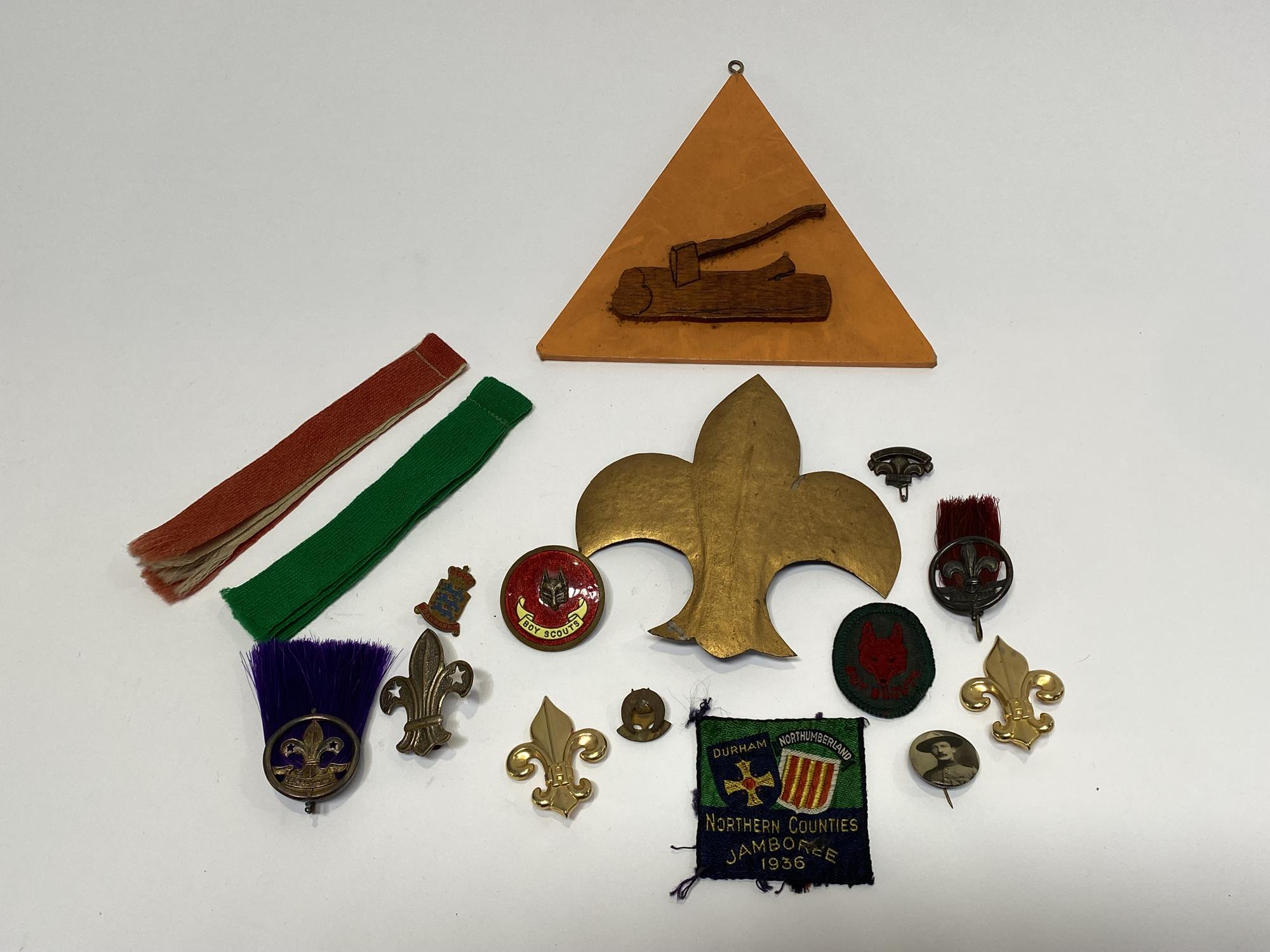 A 1936 Northern Countries Jamboree badge and other Scouting badges