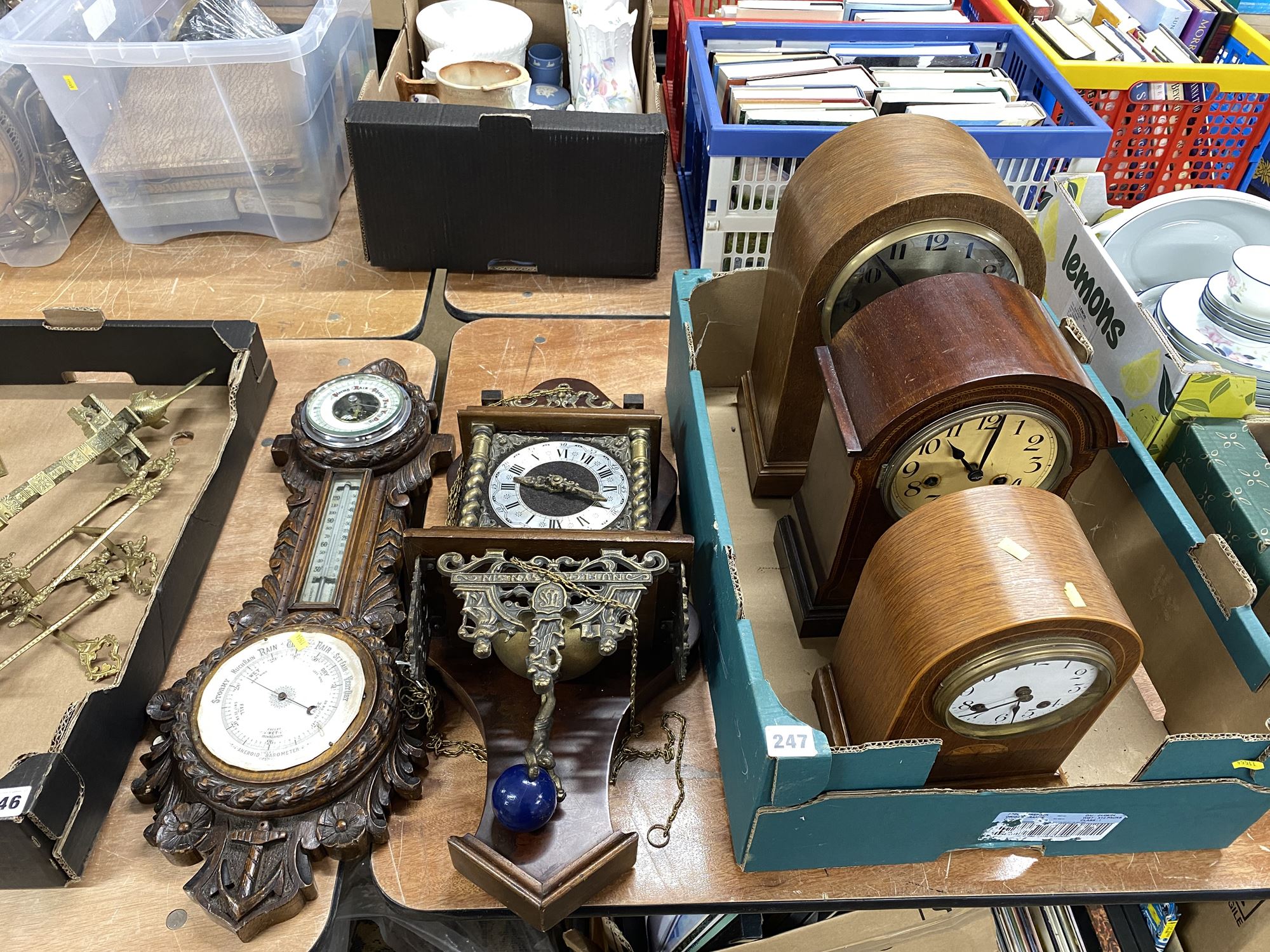A box of mantel clocks, early 20th Century, a Dutch style wall clock ...