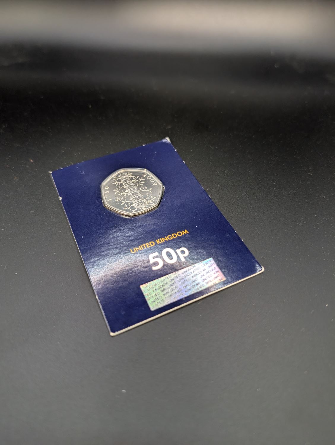 A boxed 2009 50p Kew Garden circulated coin