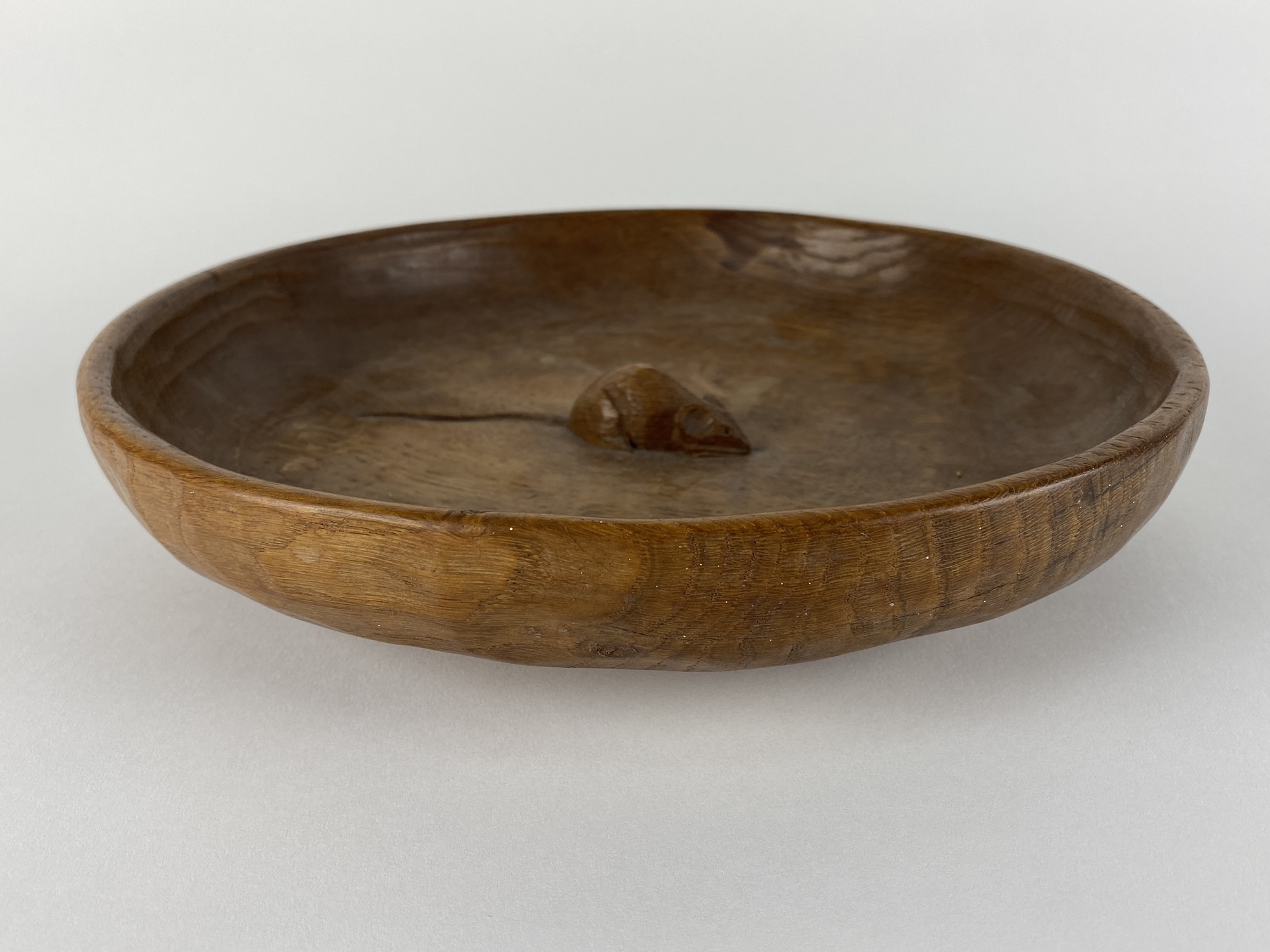 A Robert Thompson of Kilburn 'Mouseman' bowl, with carved mouse to the ...