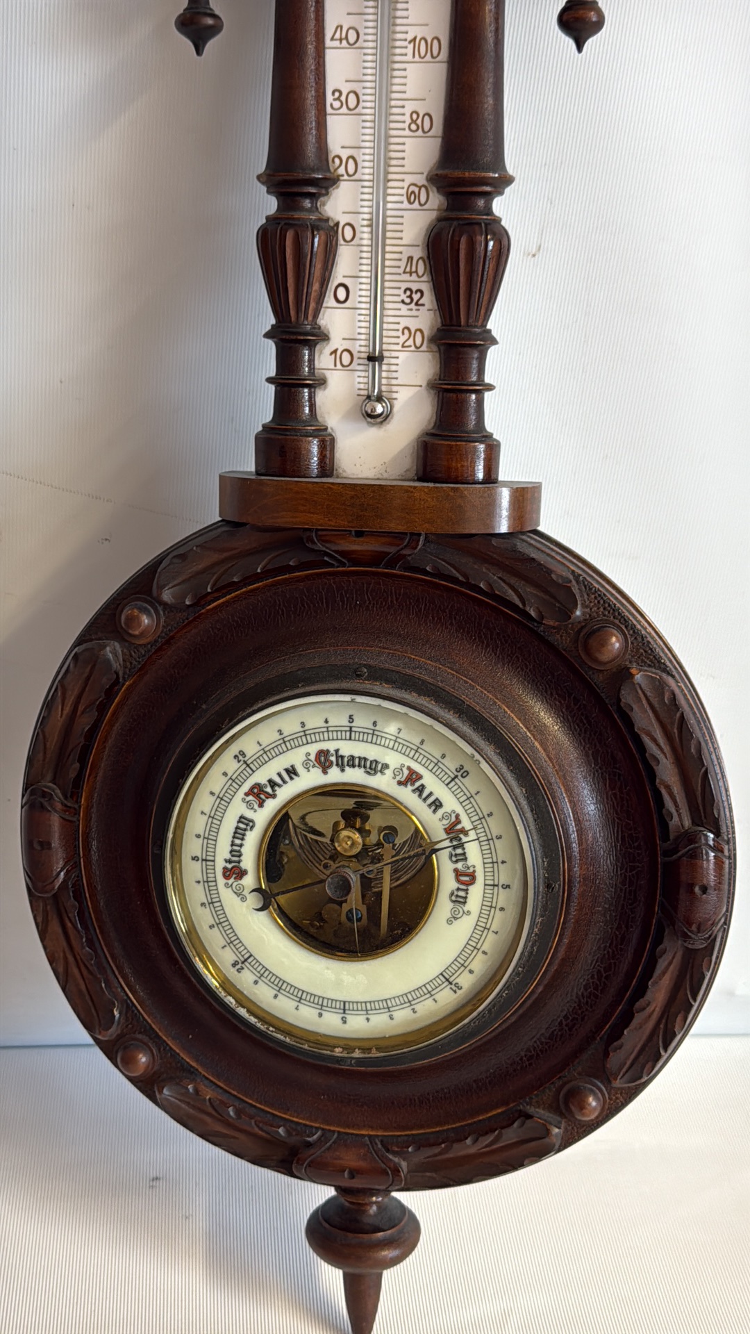 Victorian carved walnut aneroid barometer and thermometer