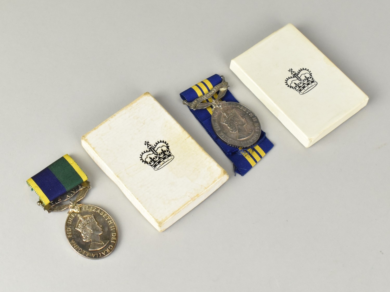 A Boxed QEII For Efficient Service Medals, One with The Territorial and ...
