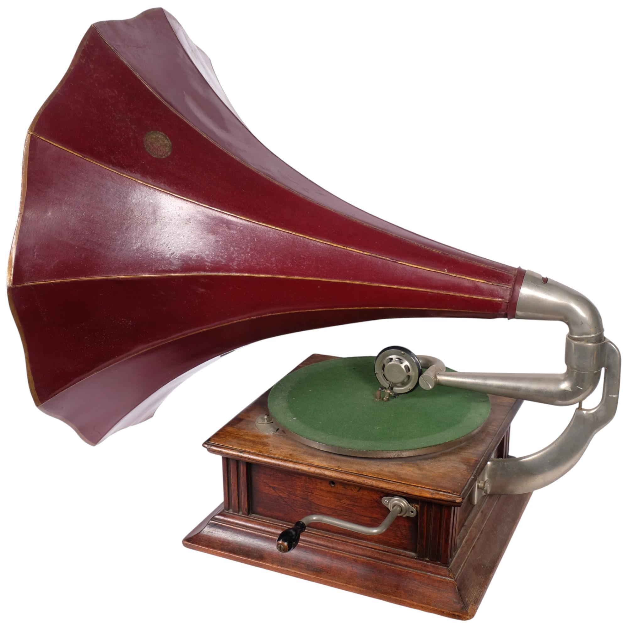 An oak HMV wind-up table-top gramophone, complete with painted steel ...
