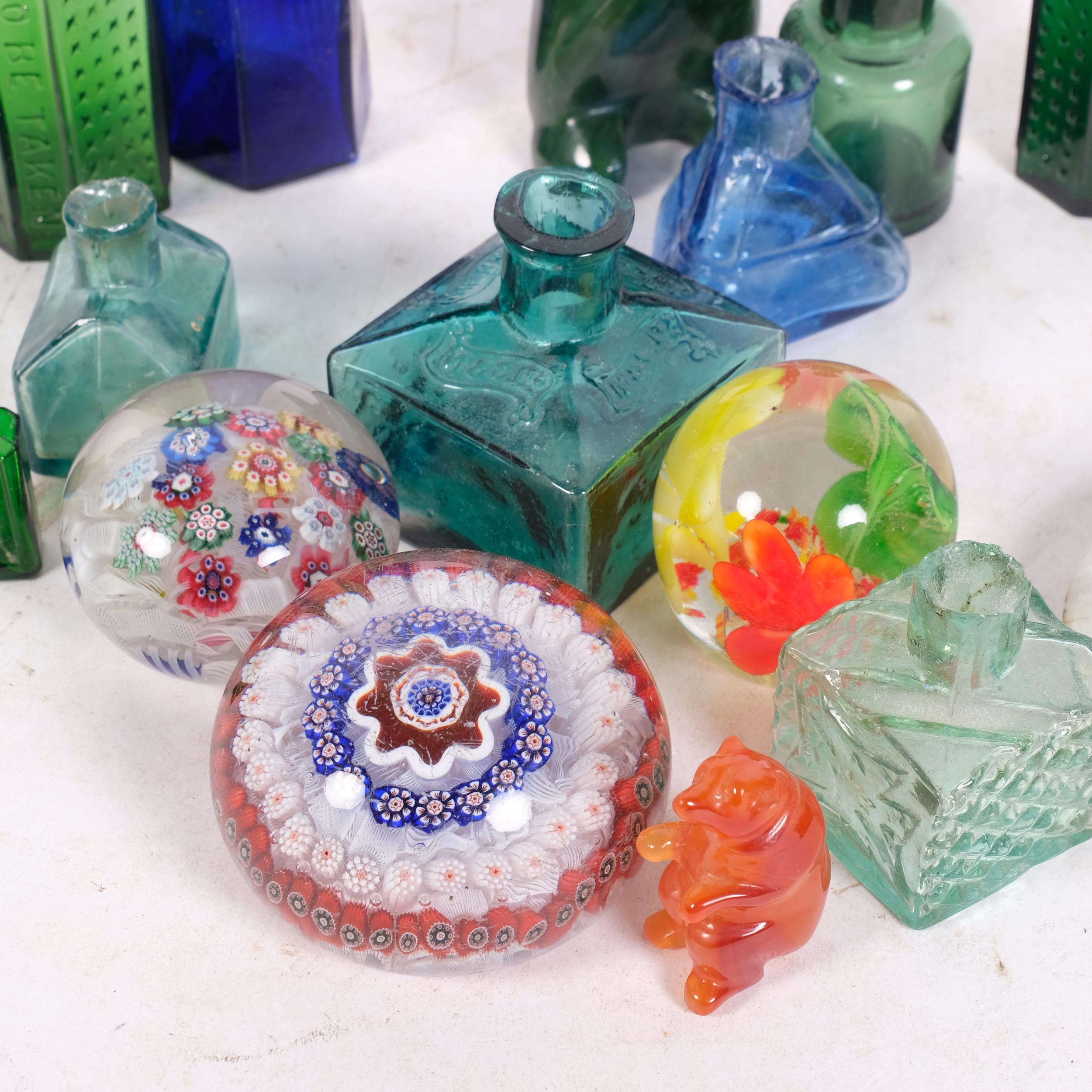 Medicine bottles, ceramic pot lid, paperweights, bear, and a jadeite ...